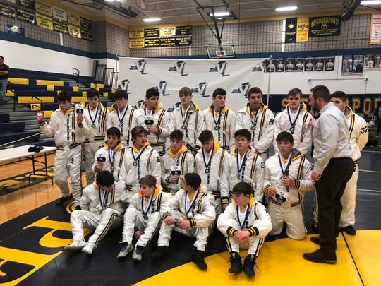 Section V wrestling: Spencerport defeats Hilton for dual meet title
