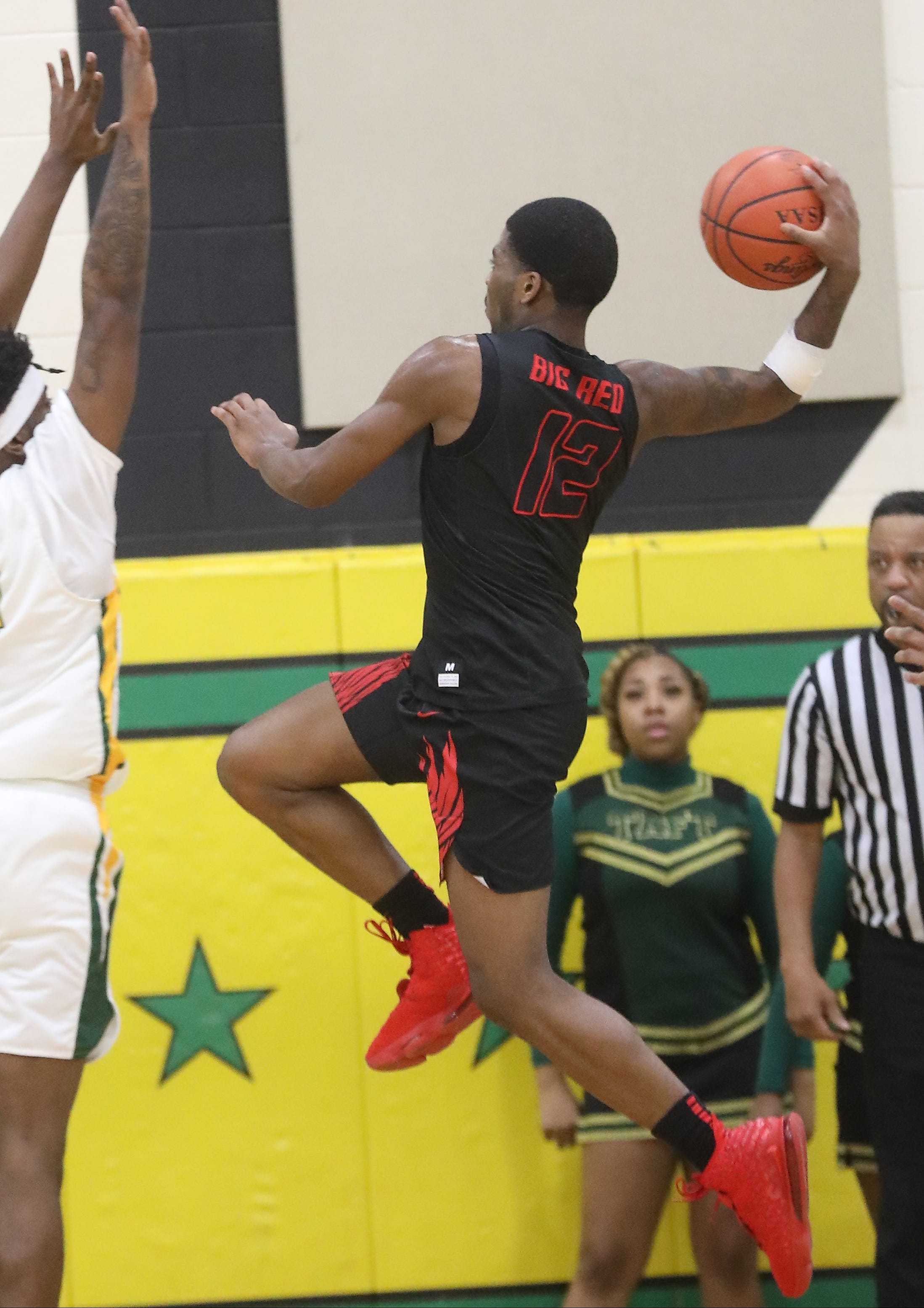 Cincinnati Hughes basketball takes control of CMAC with win over Taft