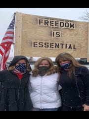 Michigan gridlock protest: See cars surround capitol in Lansing