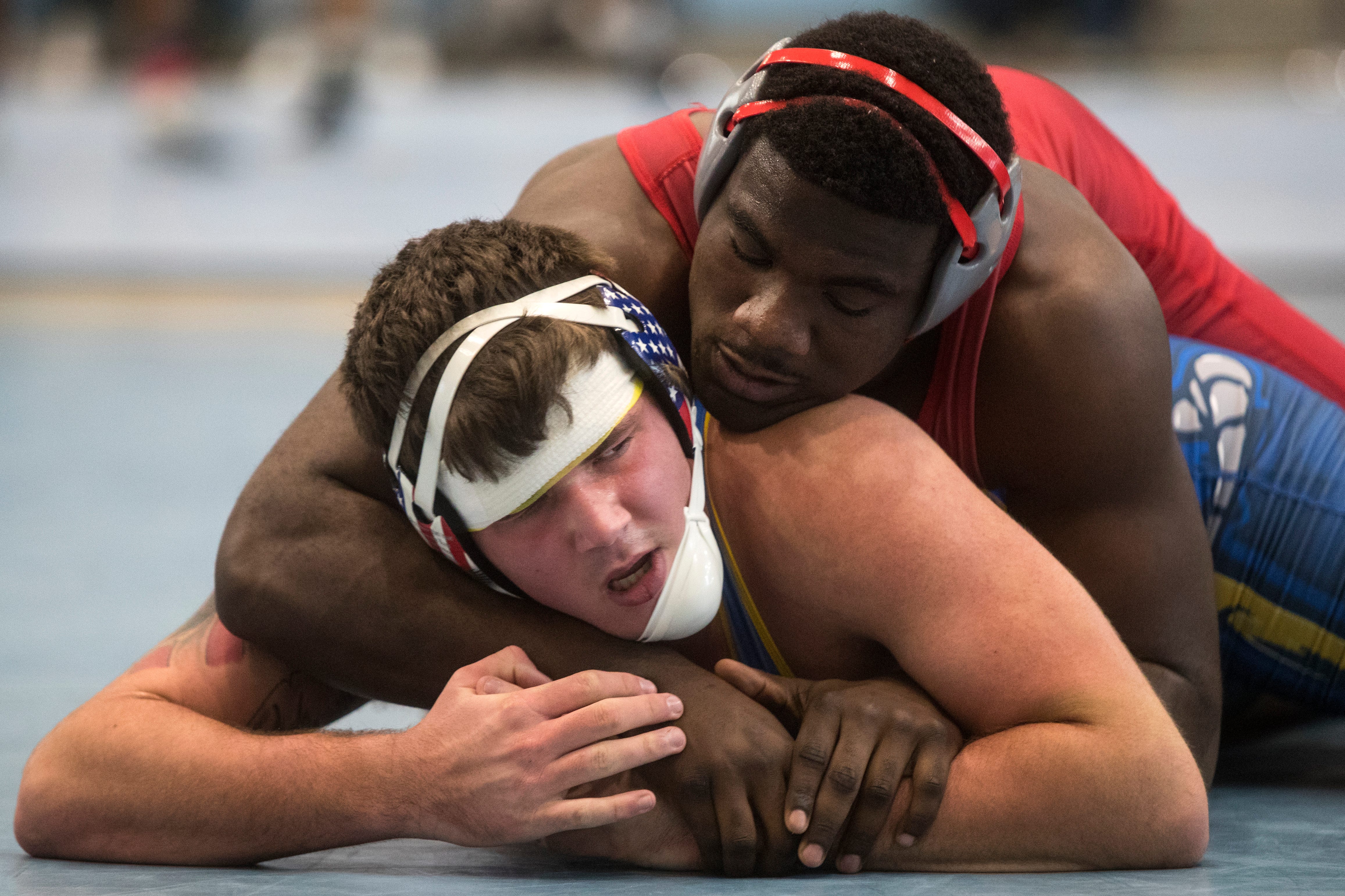Why coaches say wrestling should continue during COVID — without masks