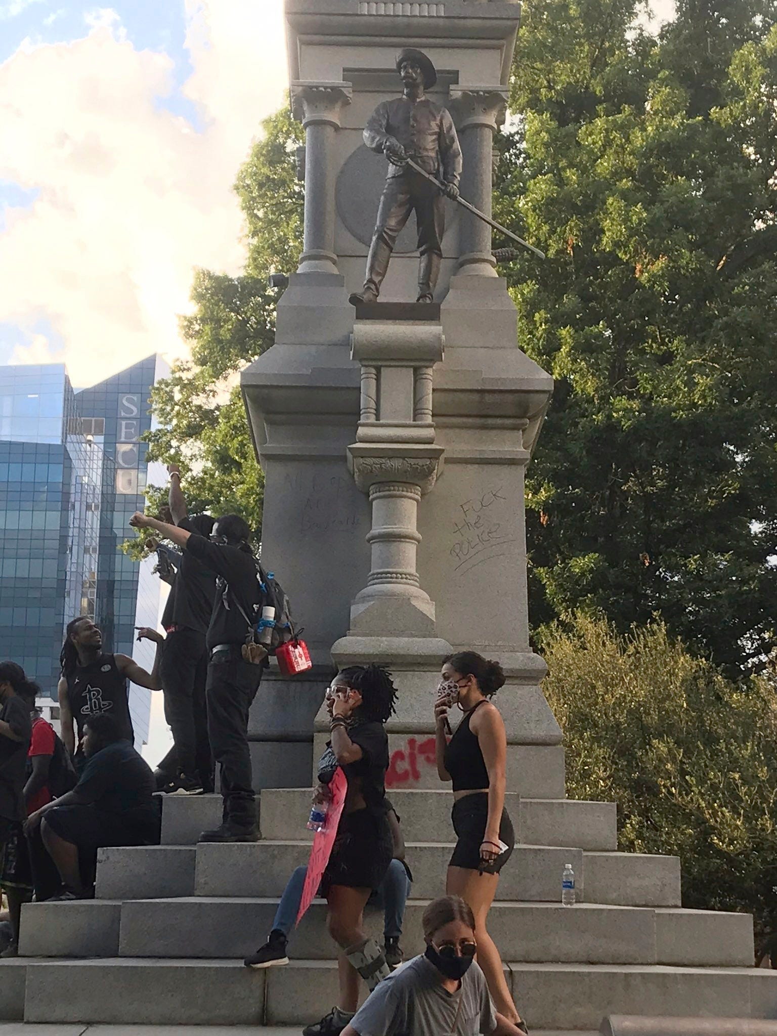 Protesters in southern cities deface Confederate monuments
