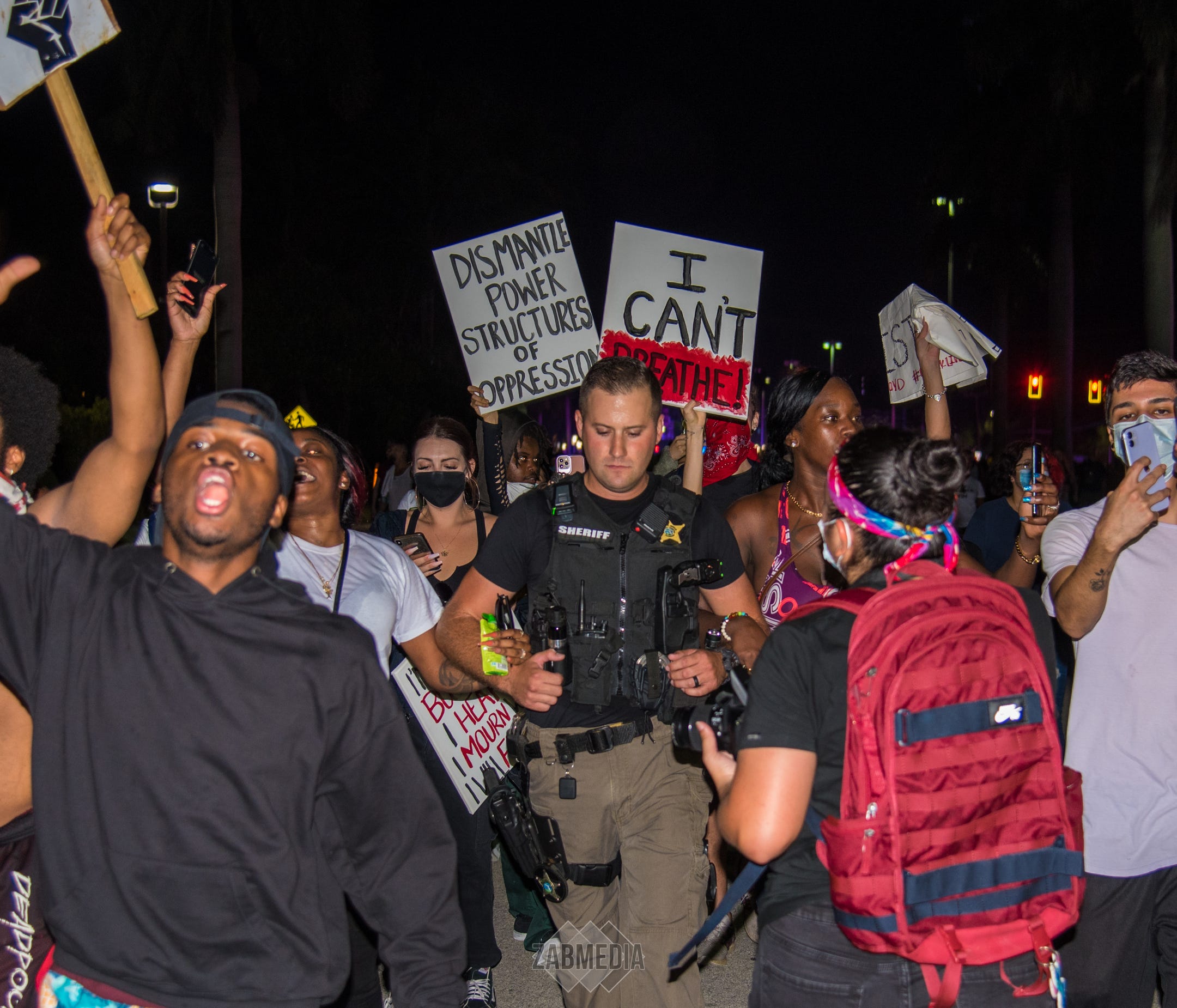 George Floyd protest: Two women escort deputy worried about protesters