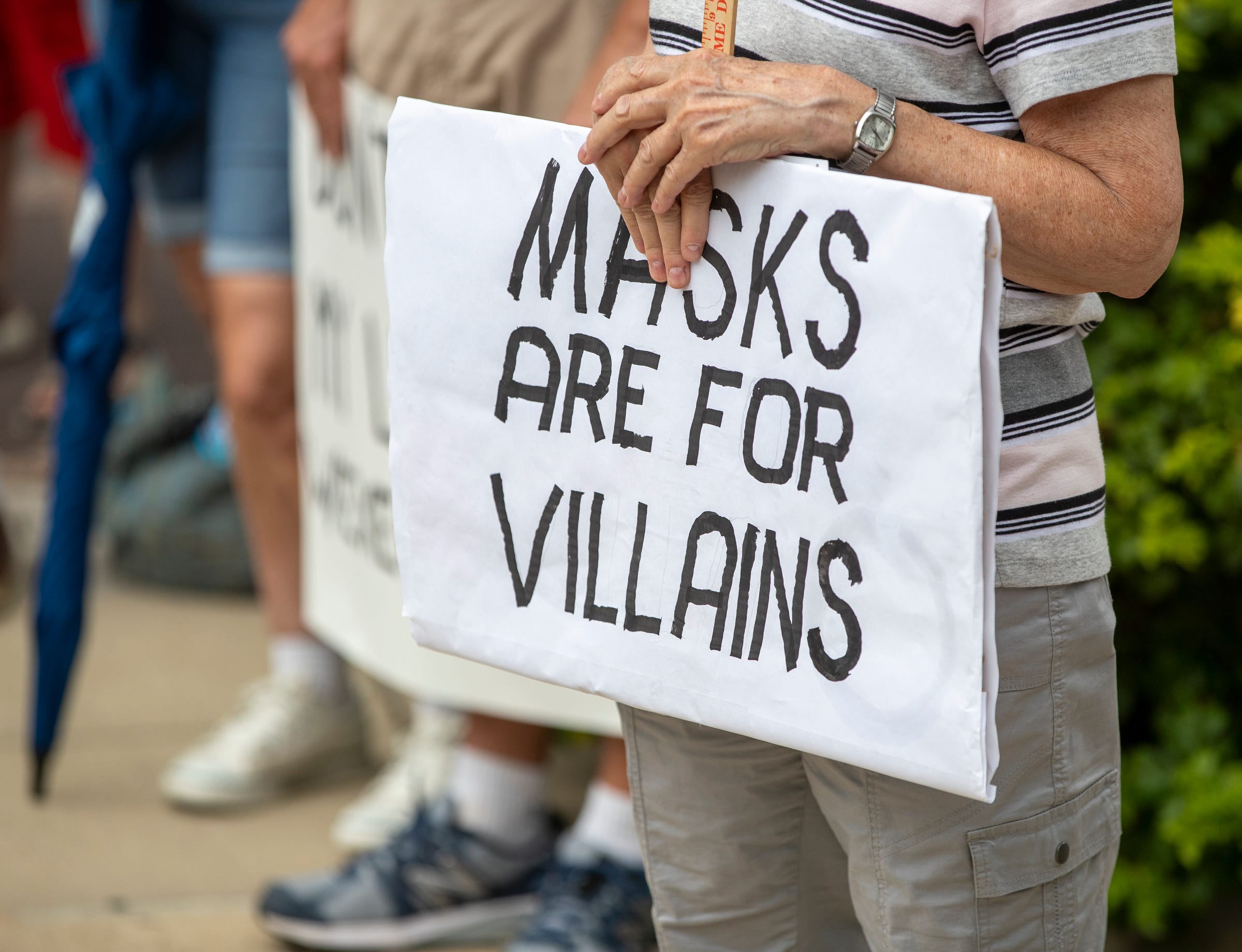 Anti-mask protesters in Indianapolis claim governmental overreach