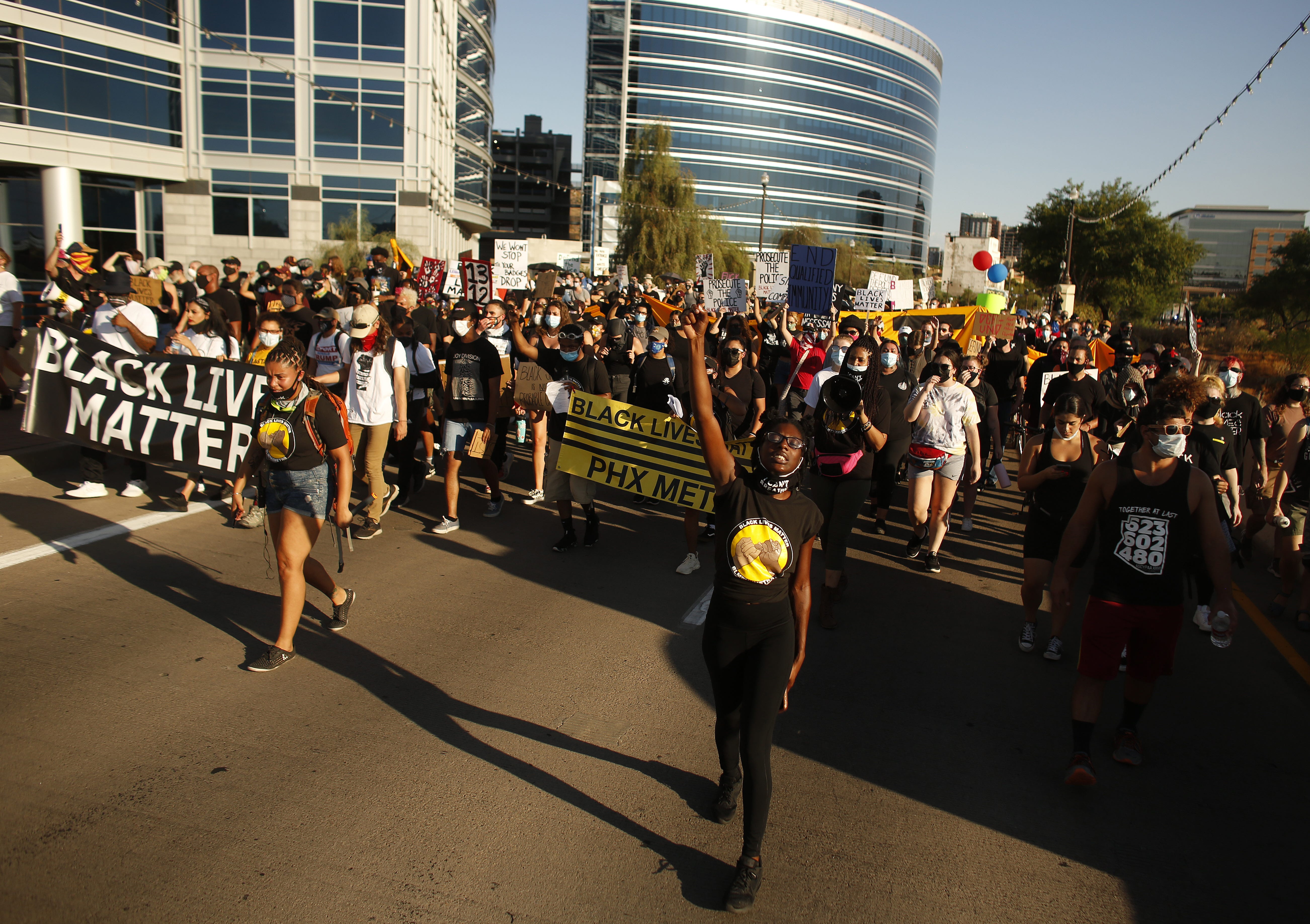 Protesters march at Tempe Beach Park for Dion Johnson, Dalvin Hollins