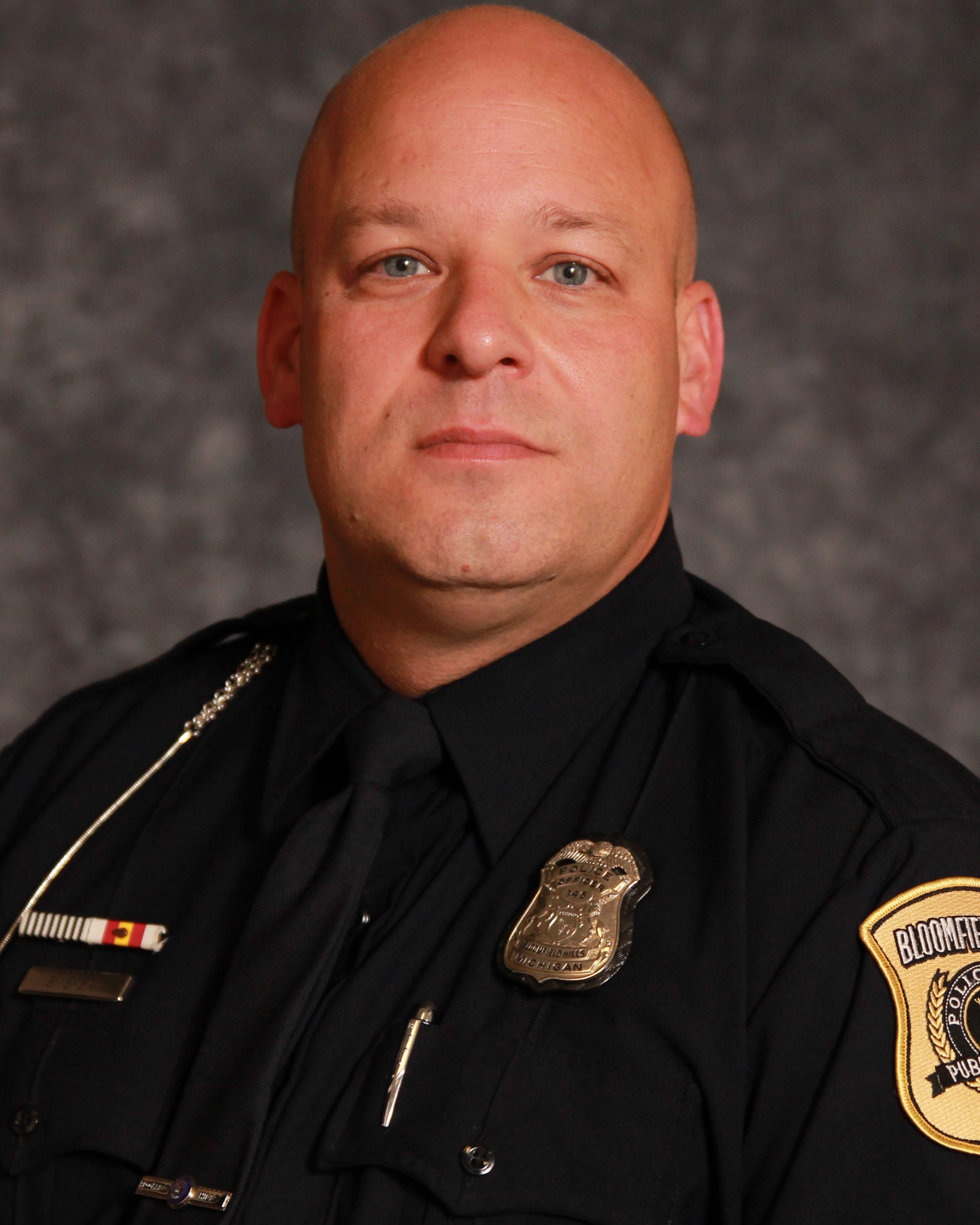 Bloomfield Hills sergeant dies at police station after cutting up tree ...