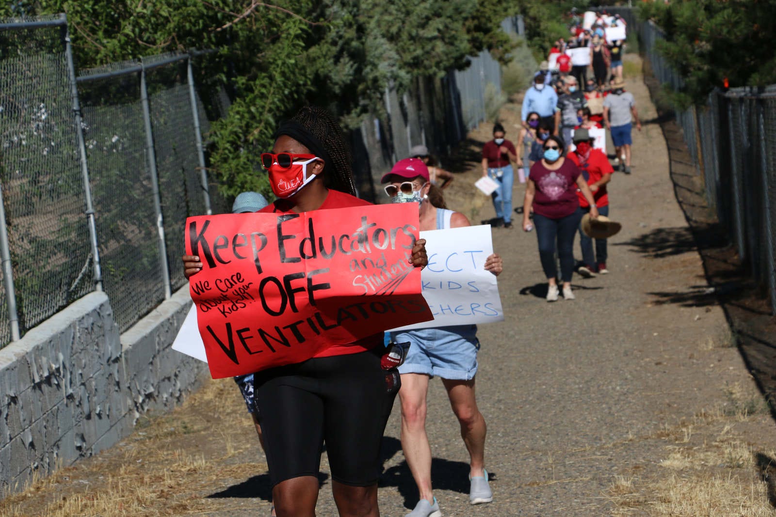 WCSD teachers march to protest the opening of schools