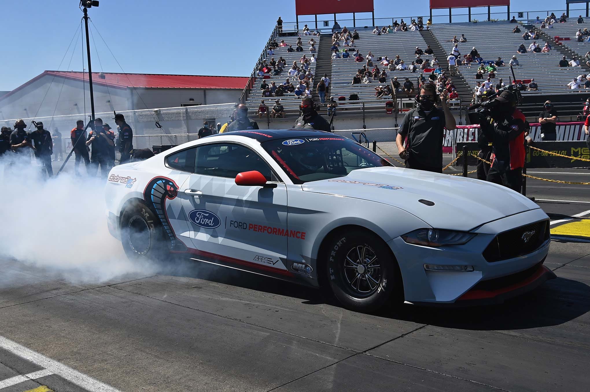 Which one wins?: V-8 Mustang Cobra Jet dragster vs. electric Cobra