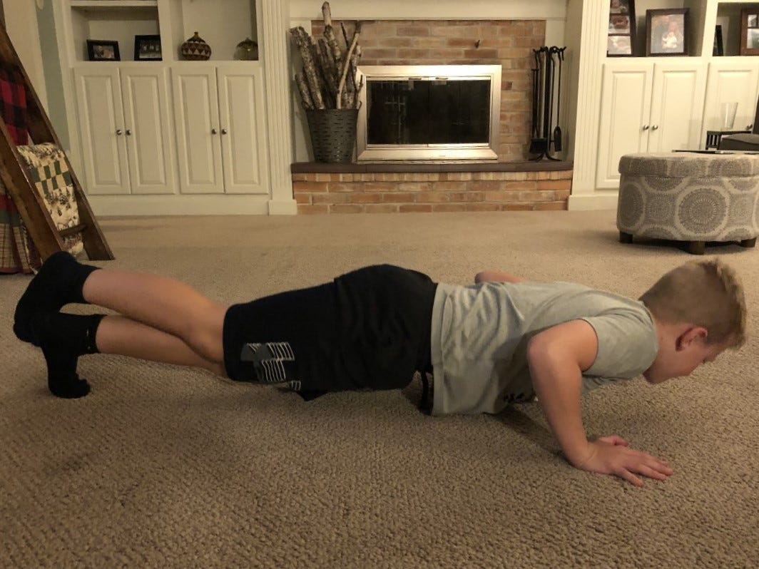 Waukesha, Wisconsin, wrestler close to 100,000 pushups in a year