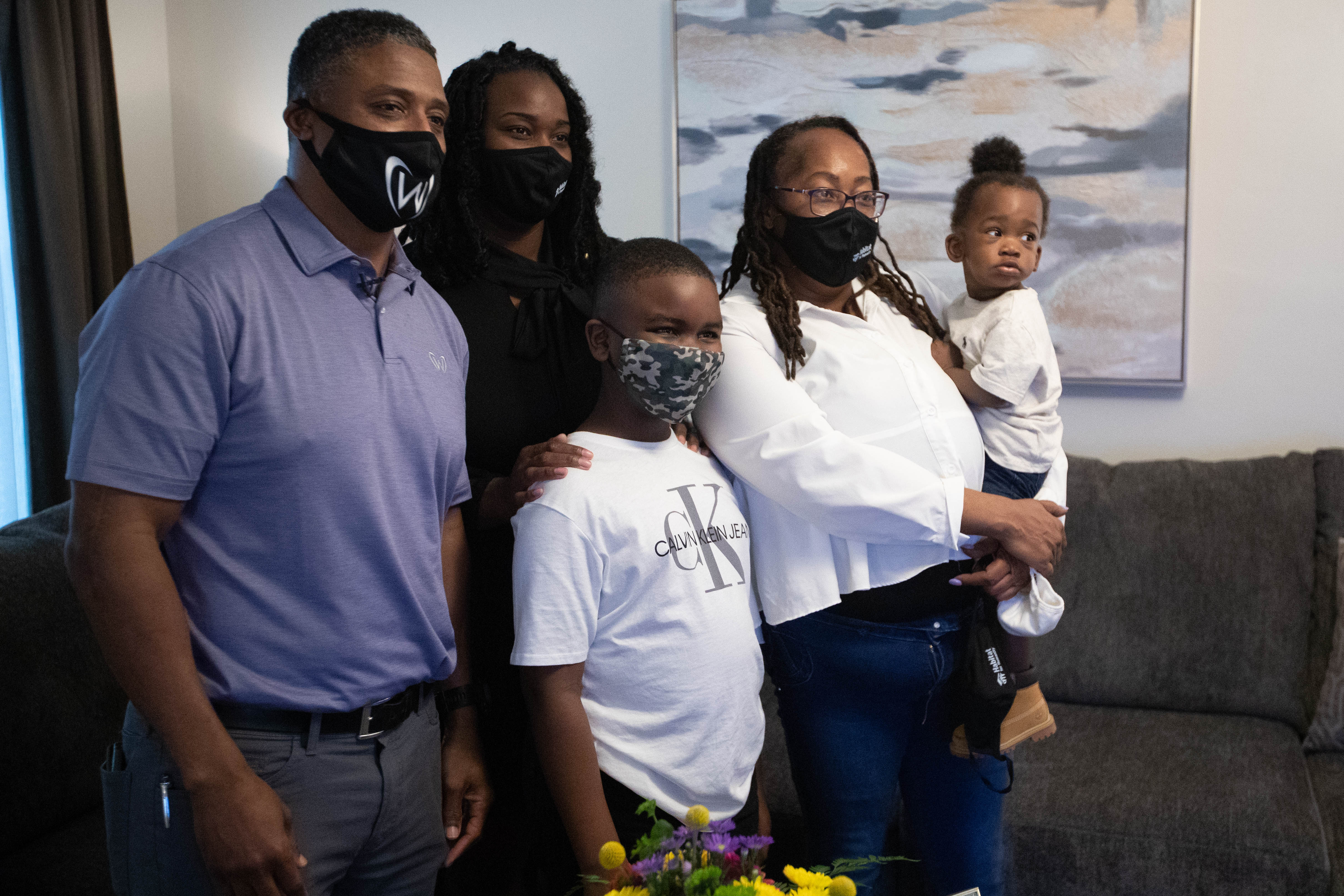 FSU legend Warrick Dunn surprises single mothers with new homes
