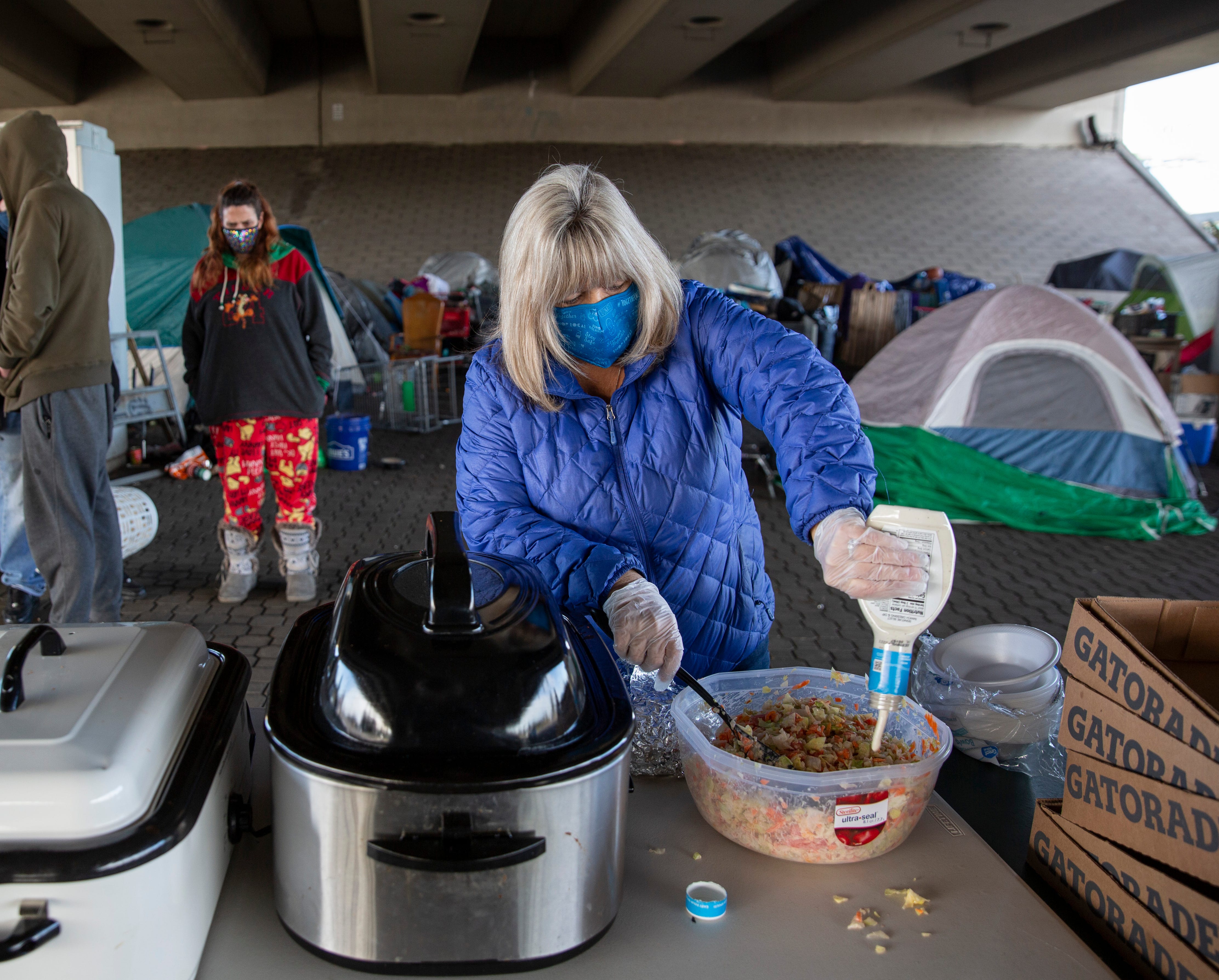 Salem volunteers help homeless under Interstate 5 at Market Street