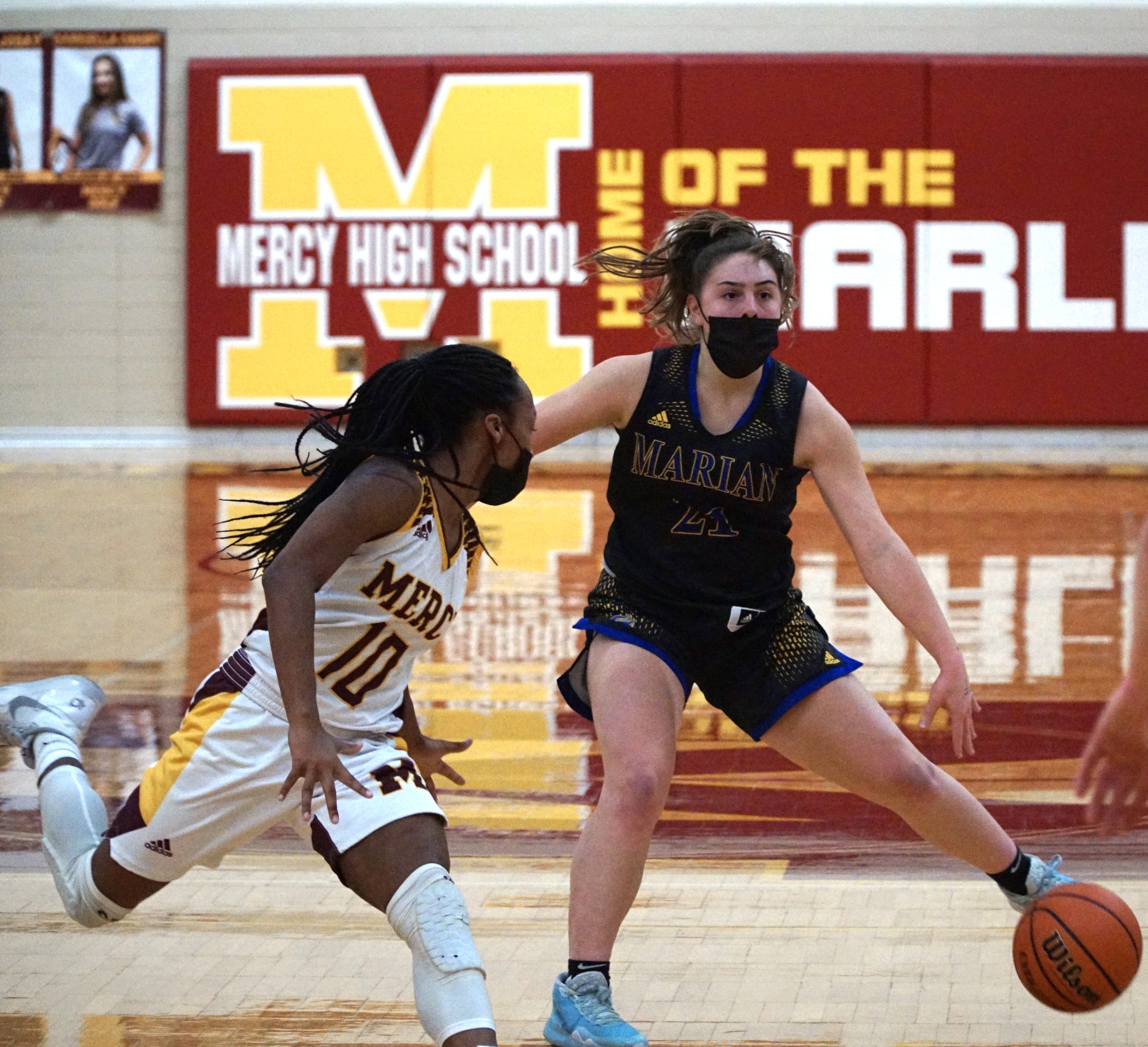 Marian girls basketball beats rival Mercy in double-overtime