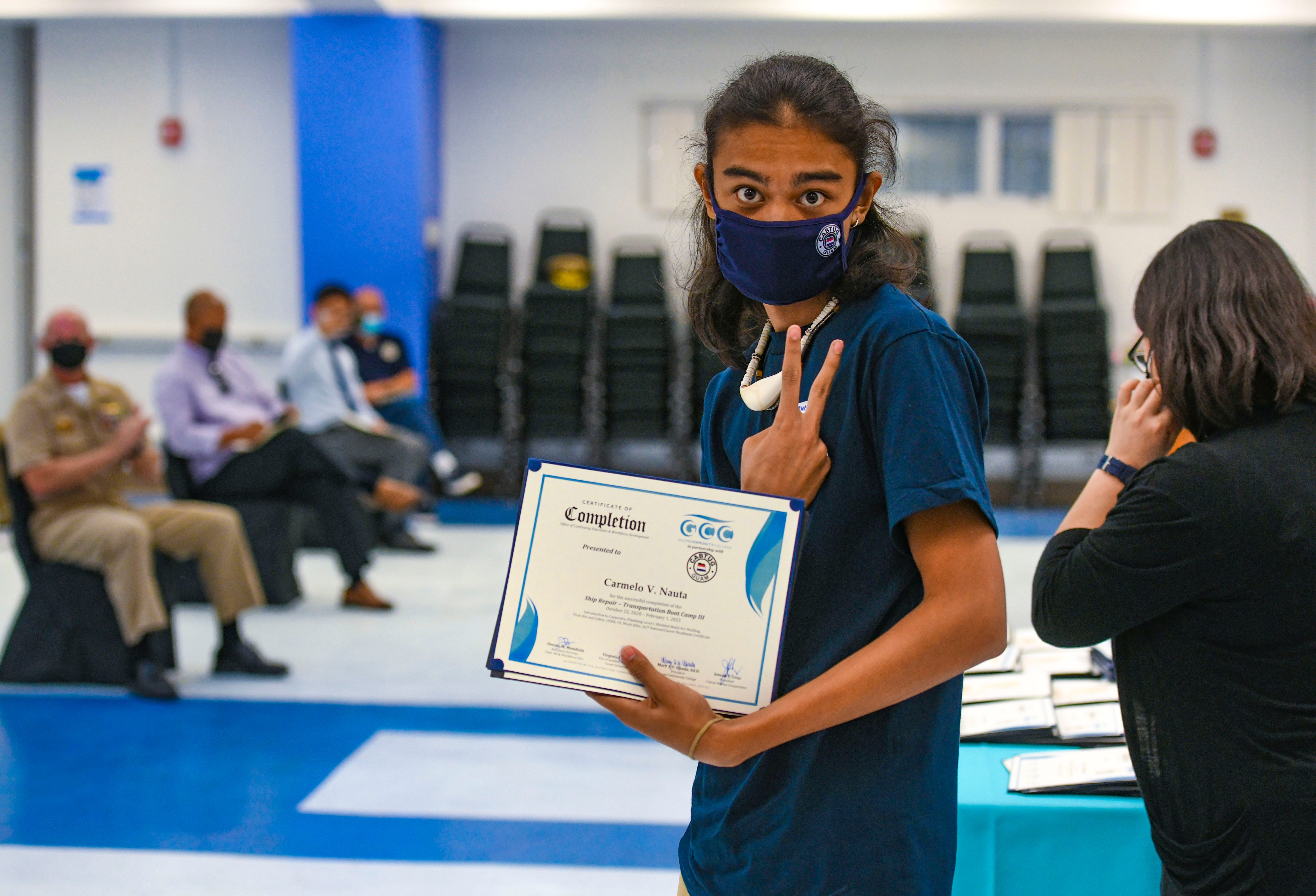 Guam Community College graduates 18 apprentices for shipping industry