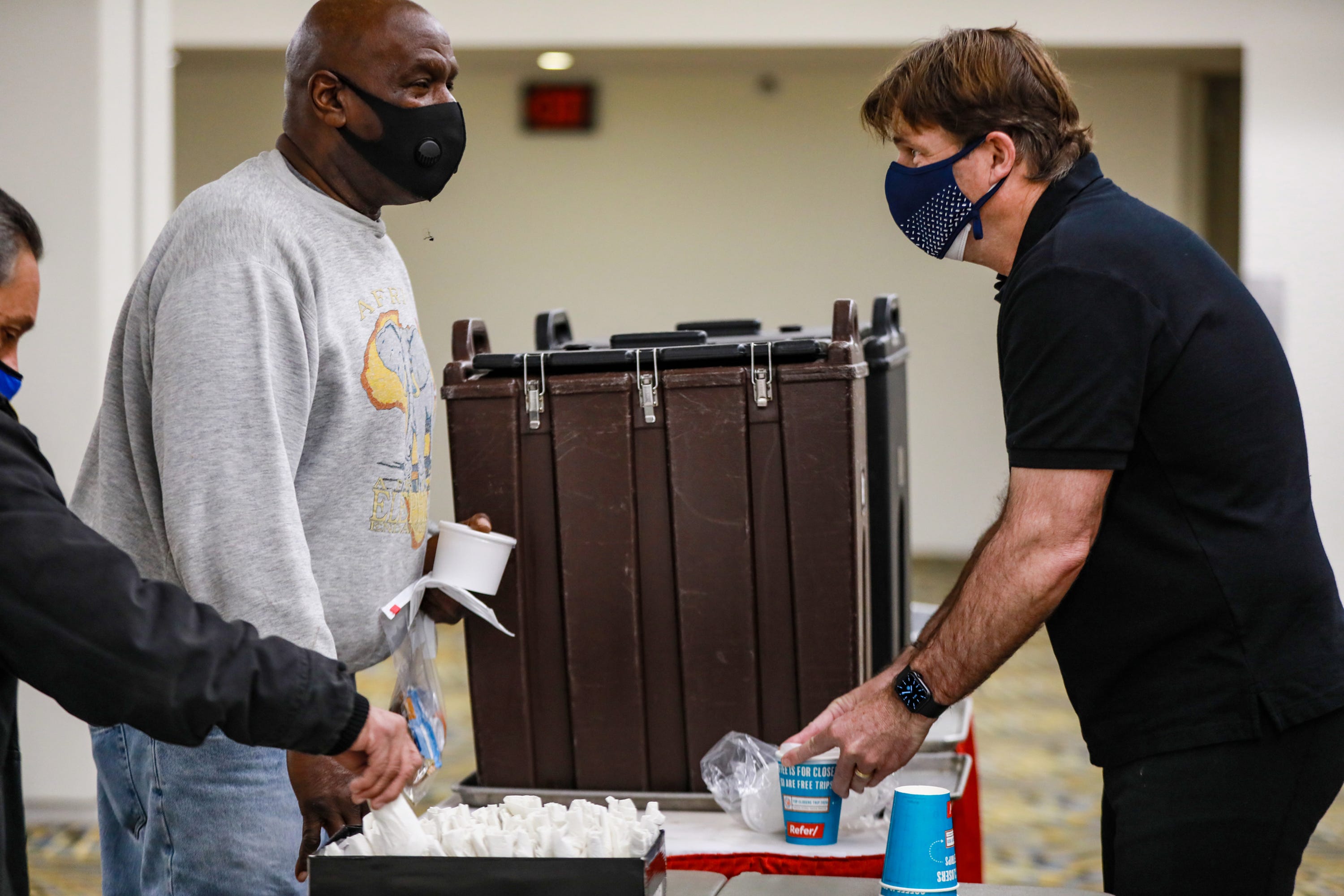At TCF Center, an unknown Jim Farley feeds the homeless in Detroit