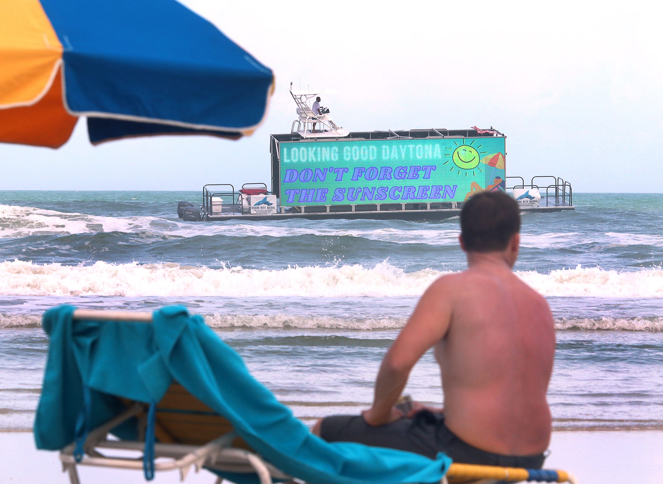 Floating billboard cruises Atlantic Ocean in Daytona Beach, Florida