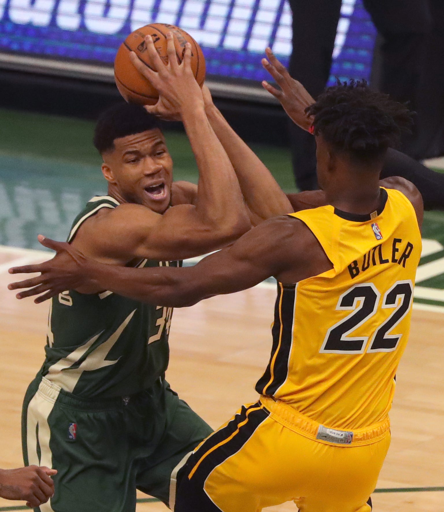 Bucks' Giannis Antetokounmpo, Heat's Jimmy Butler square off in Game 1