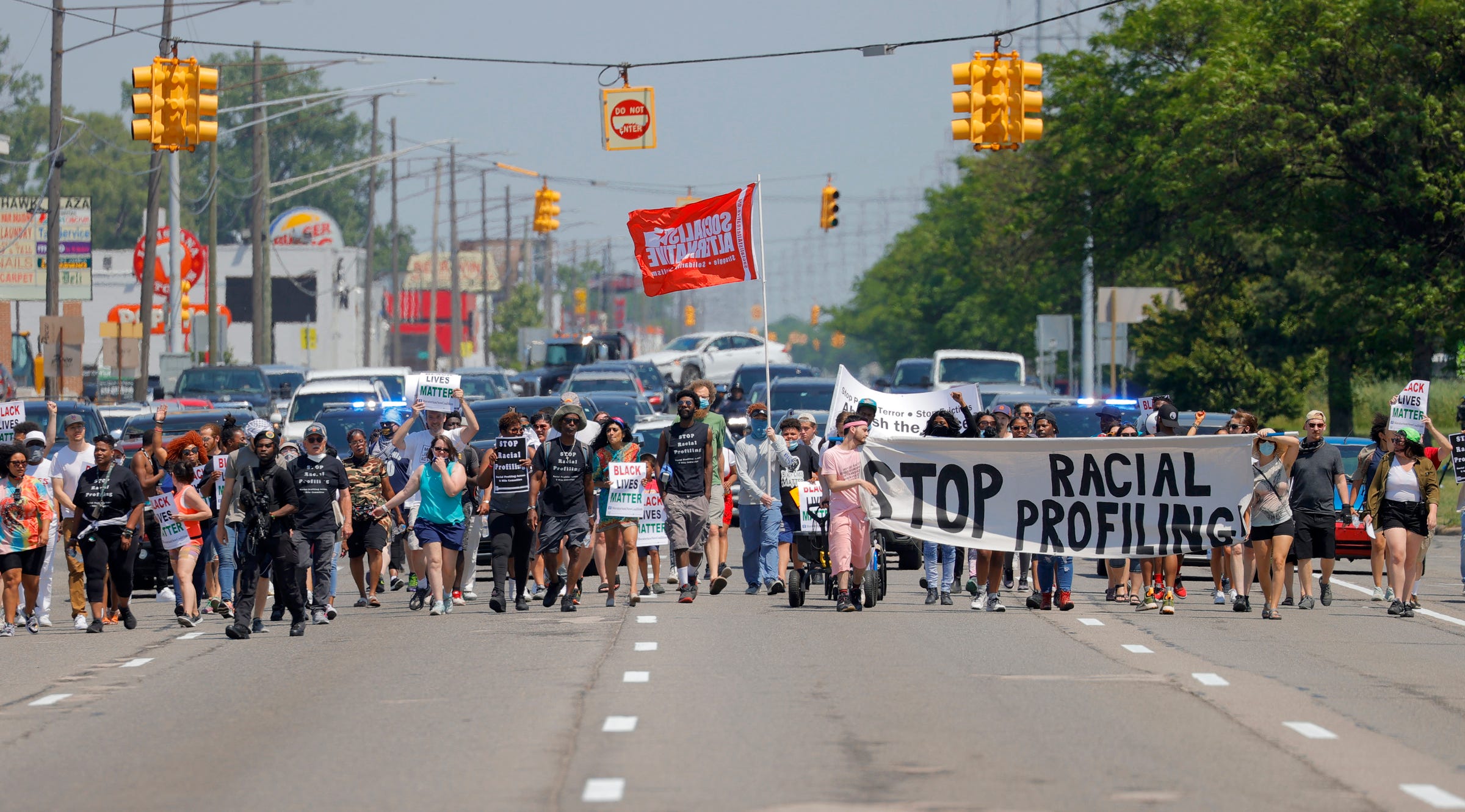 Crowd marches 8 Mile to protest racial profiling in Detroit