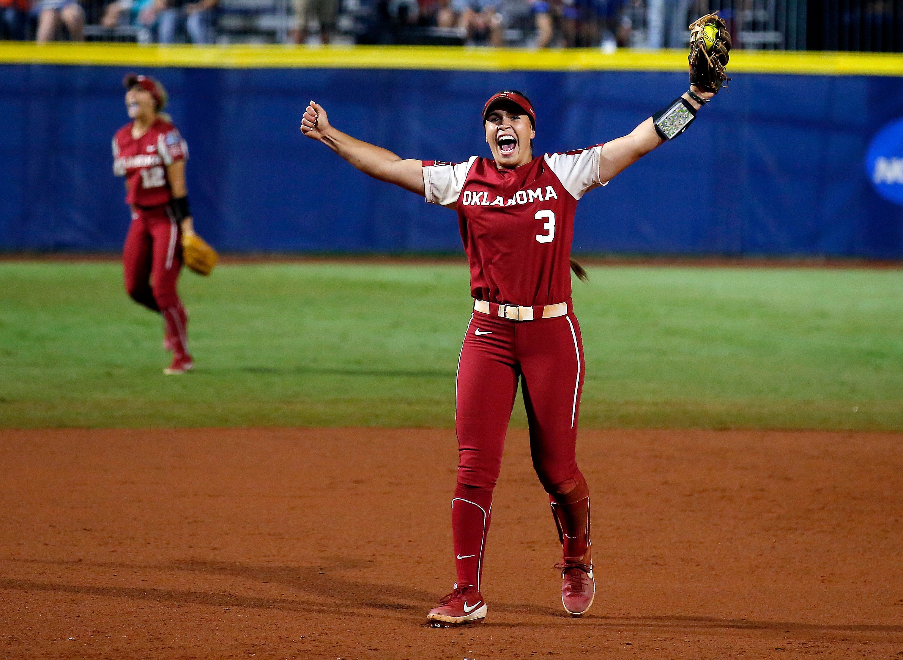 NCAA softball: OU Sooners beat JMU Dukes, force WCWS elimination game