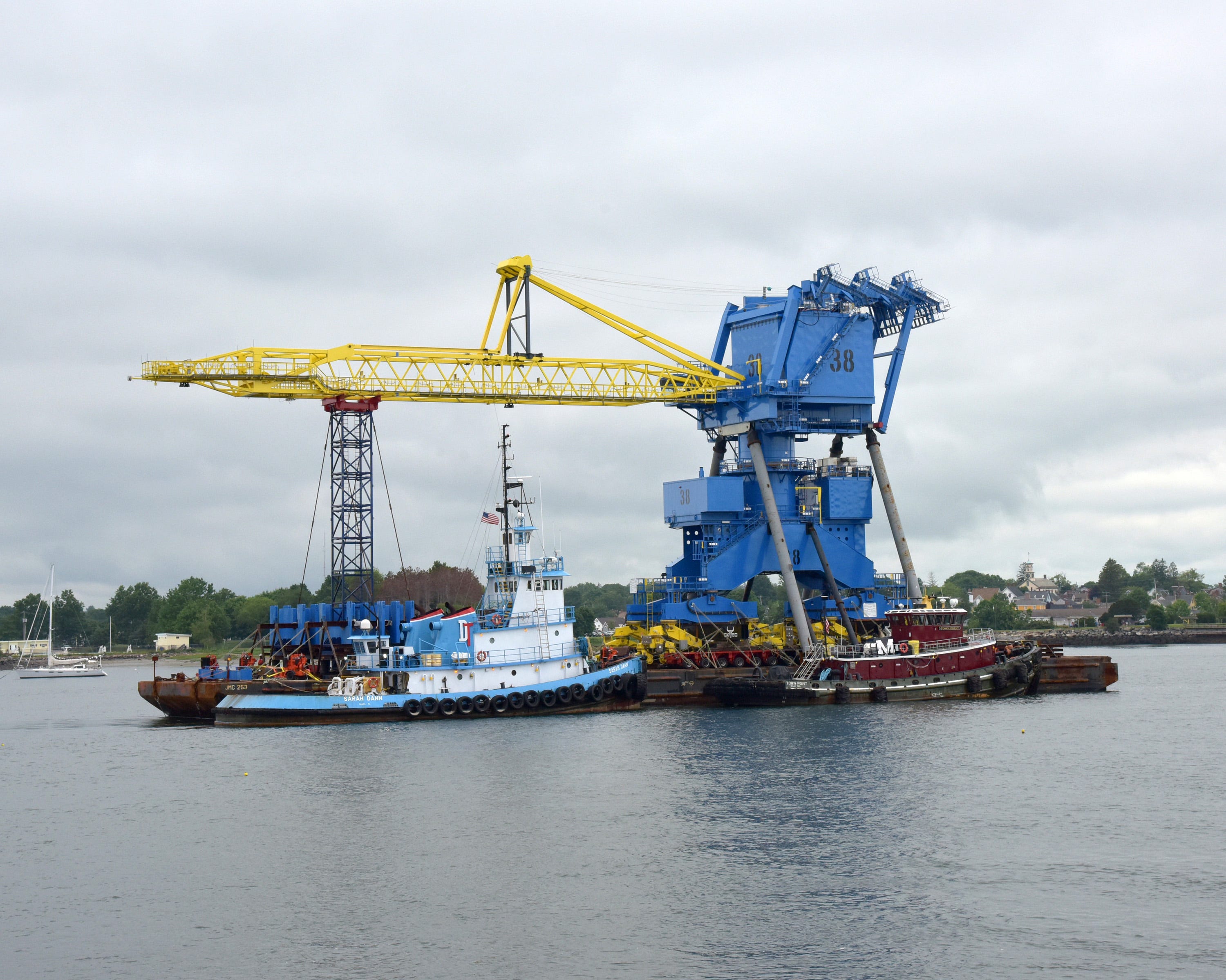 Blig Blue, the crane made in Manitowoc, arrives to U.S. Navy shipyard