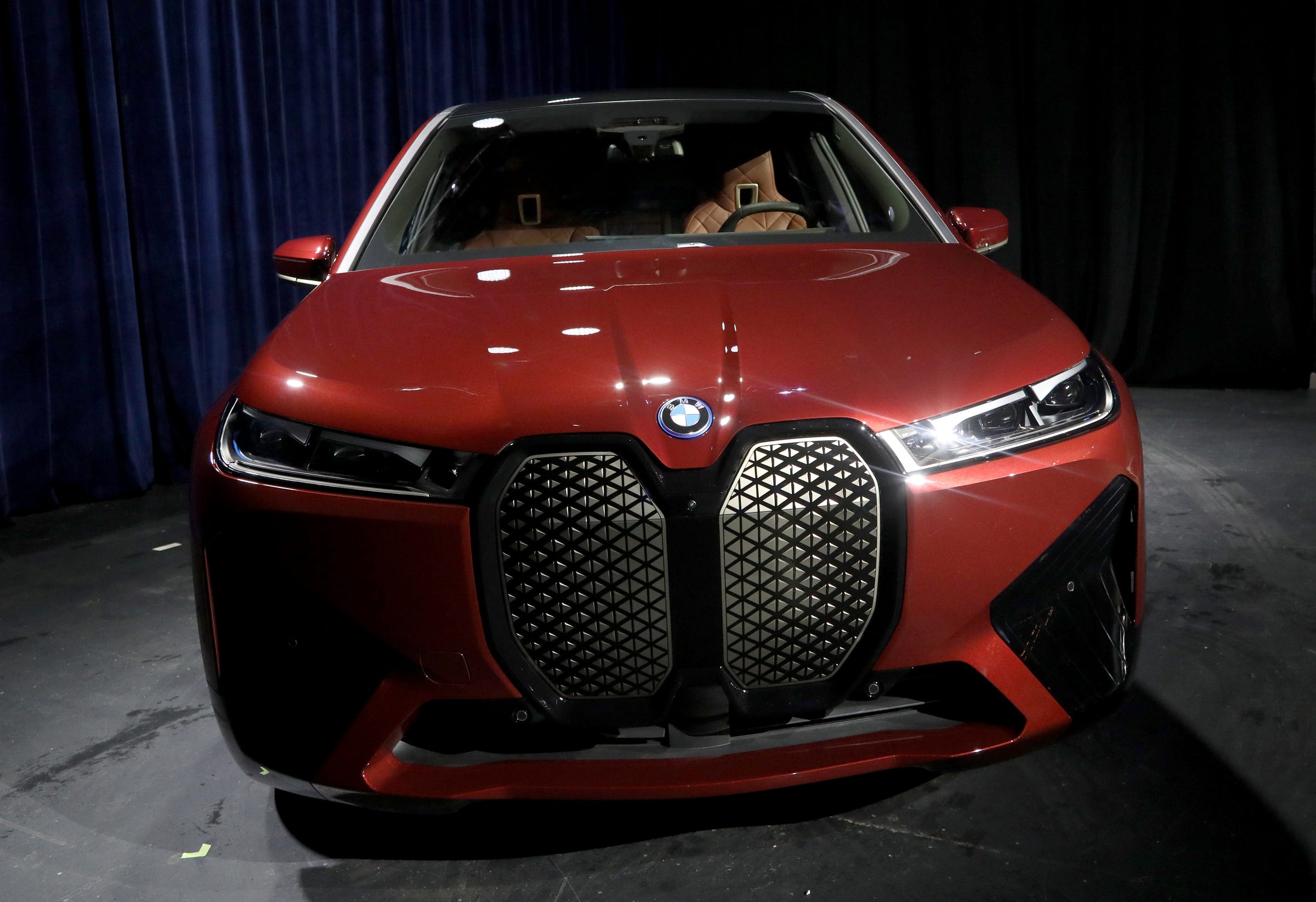 BMW reveals its EV future with $83K flagship SUV, new sport sedan