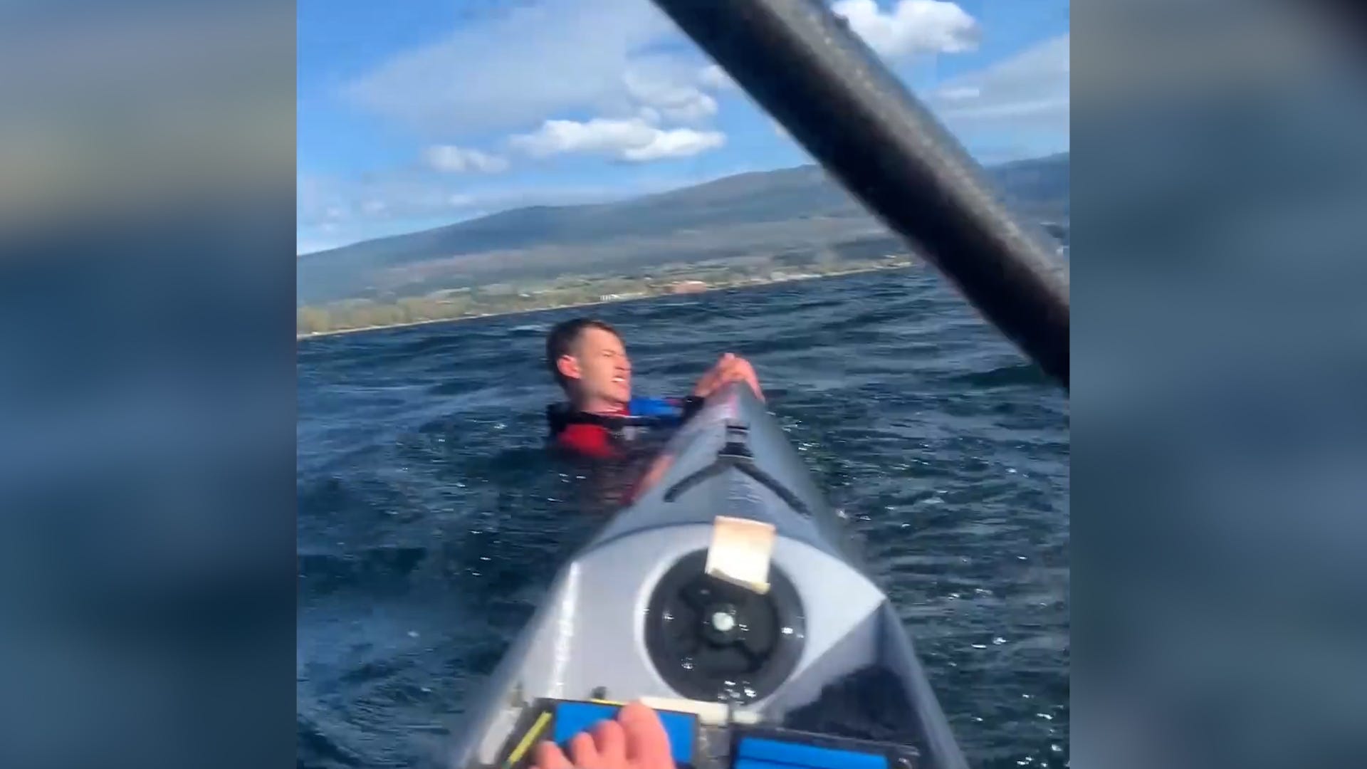 Kayaker rescues man from drowning in a lake