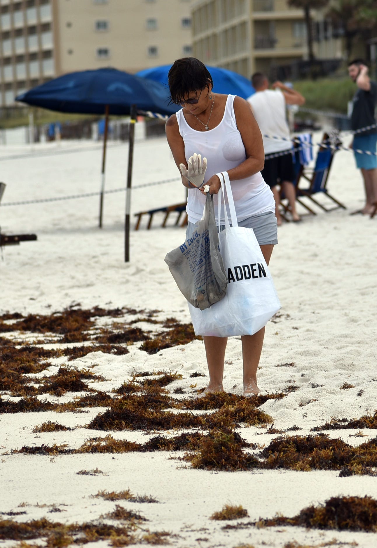 Destin woman does her part by picking up trash on Destin beaches