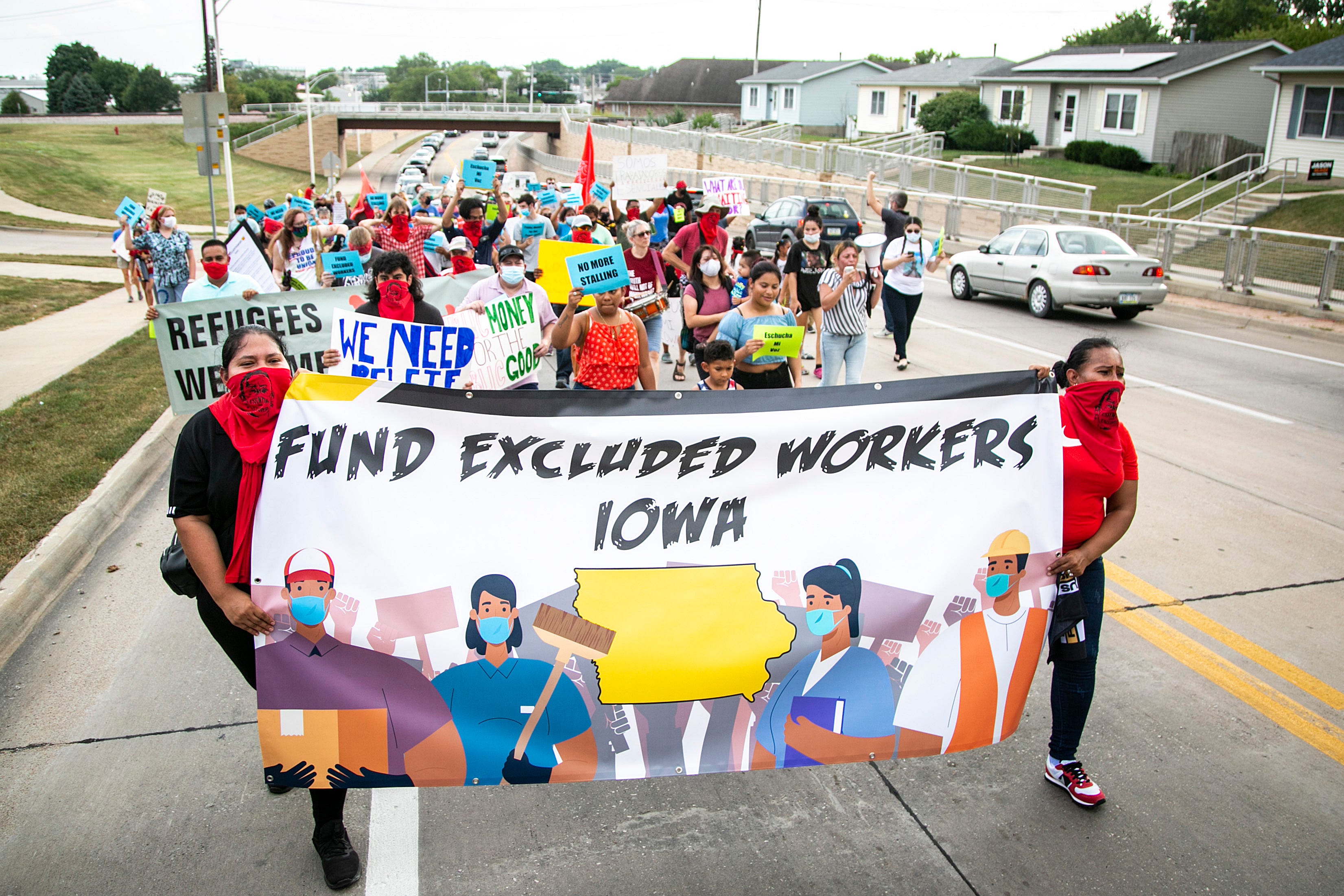 Crowd pressures Iowa City Council to give payments to excluded workers