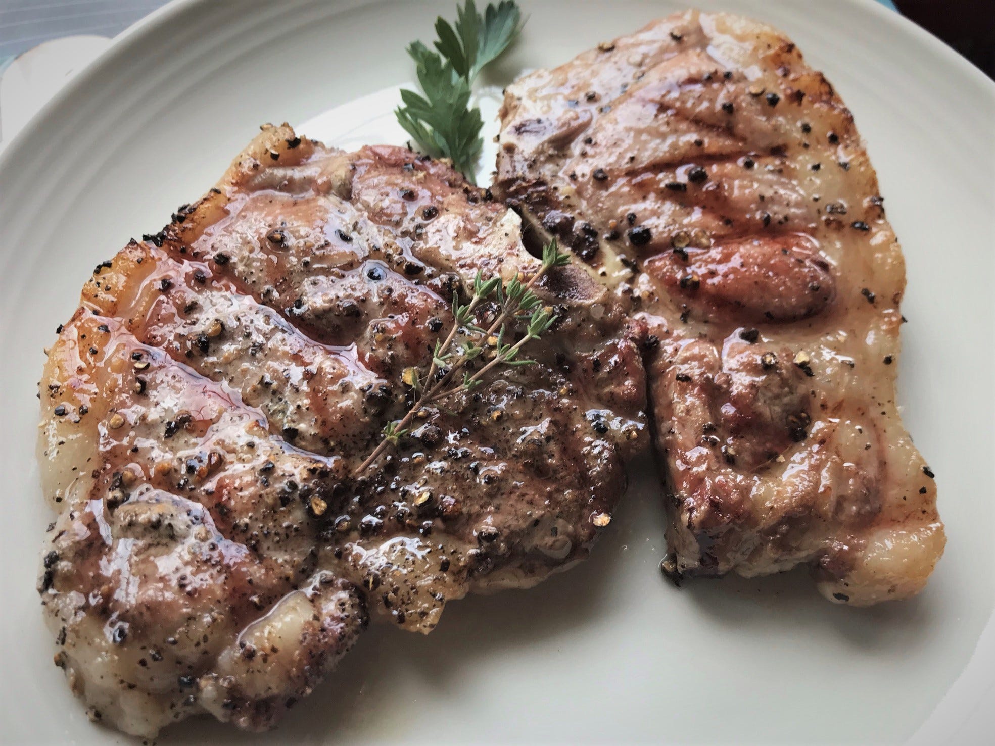 Iberico pork made into chops by method of reverse-sear in cast-iron