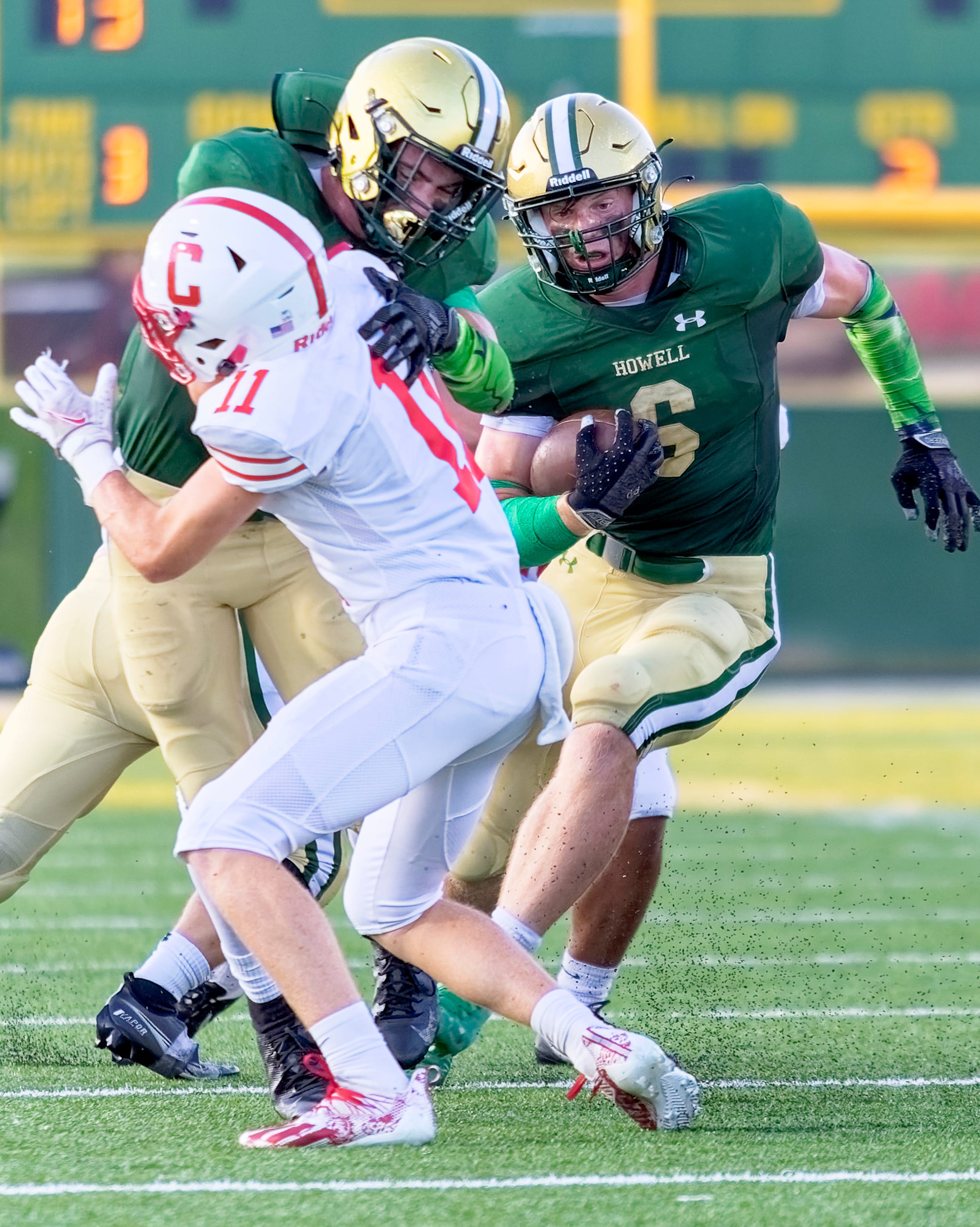 Howell football wins 'cage match' by beating Canton at its own game