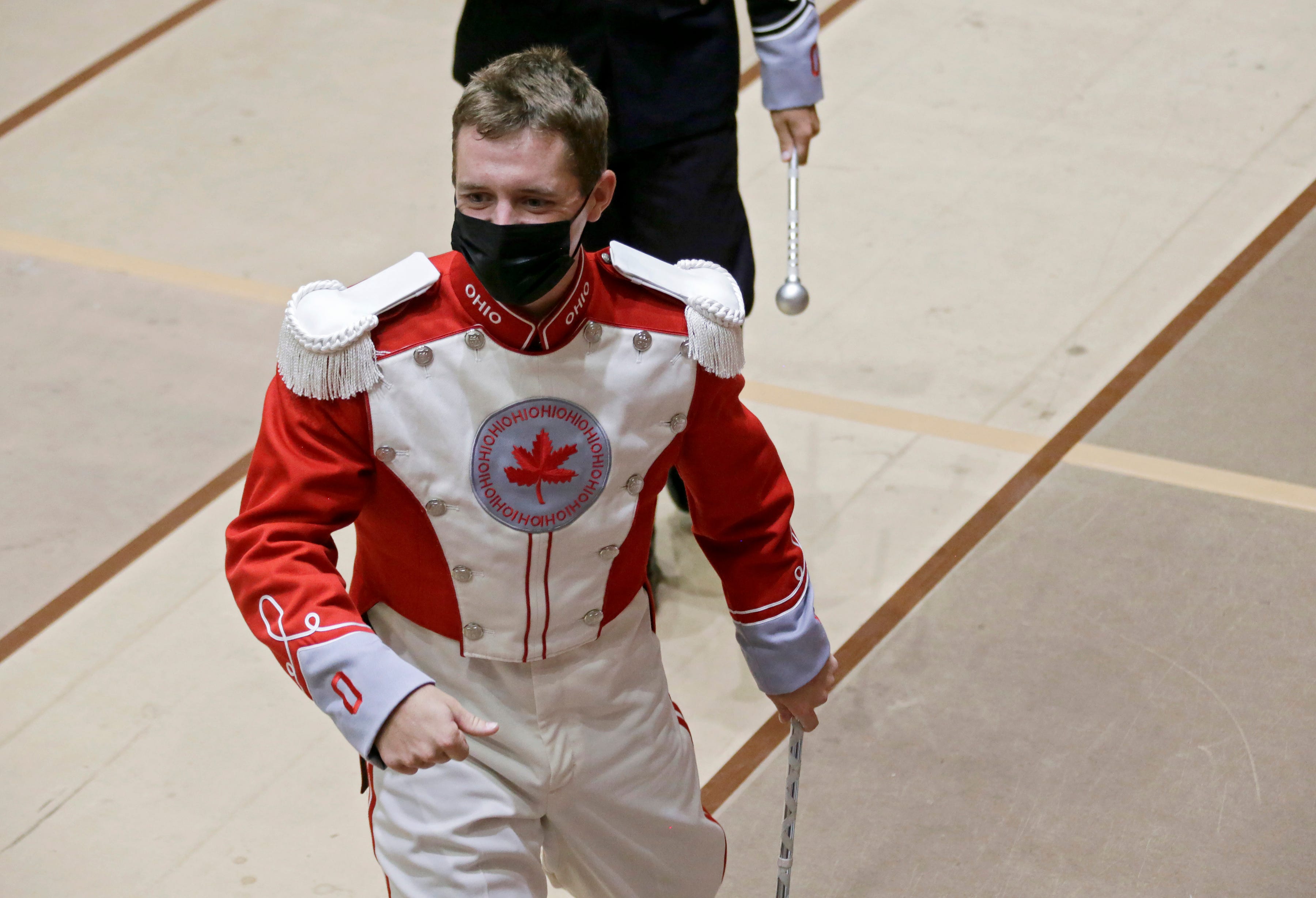 Knocked down, Ohio State drum major Austin Bowman gets back up again