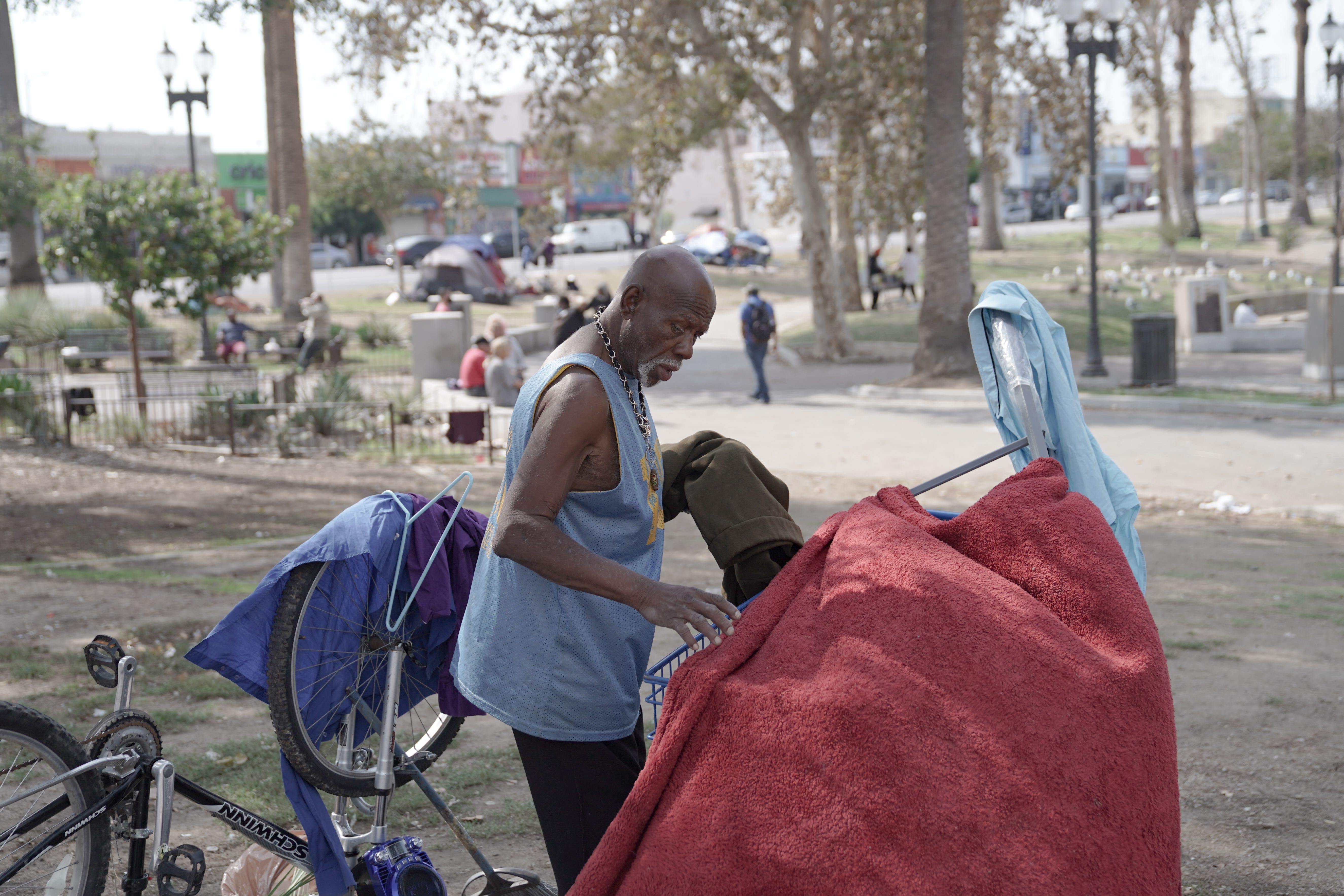 COVID-19: As homelessness grows, cities test new laws, solutions