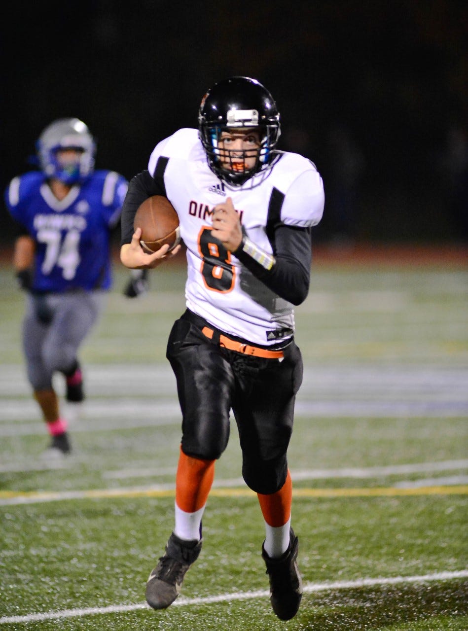 Playing football or listening to Frankie Valli, Diman QB is all in