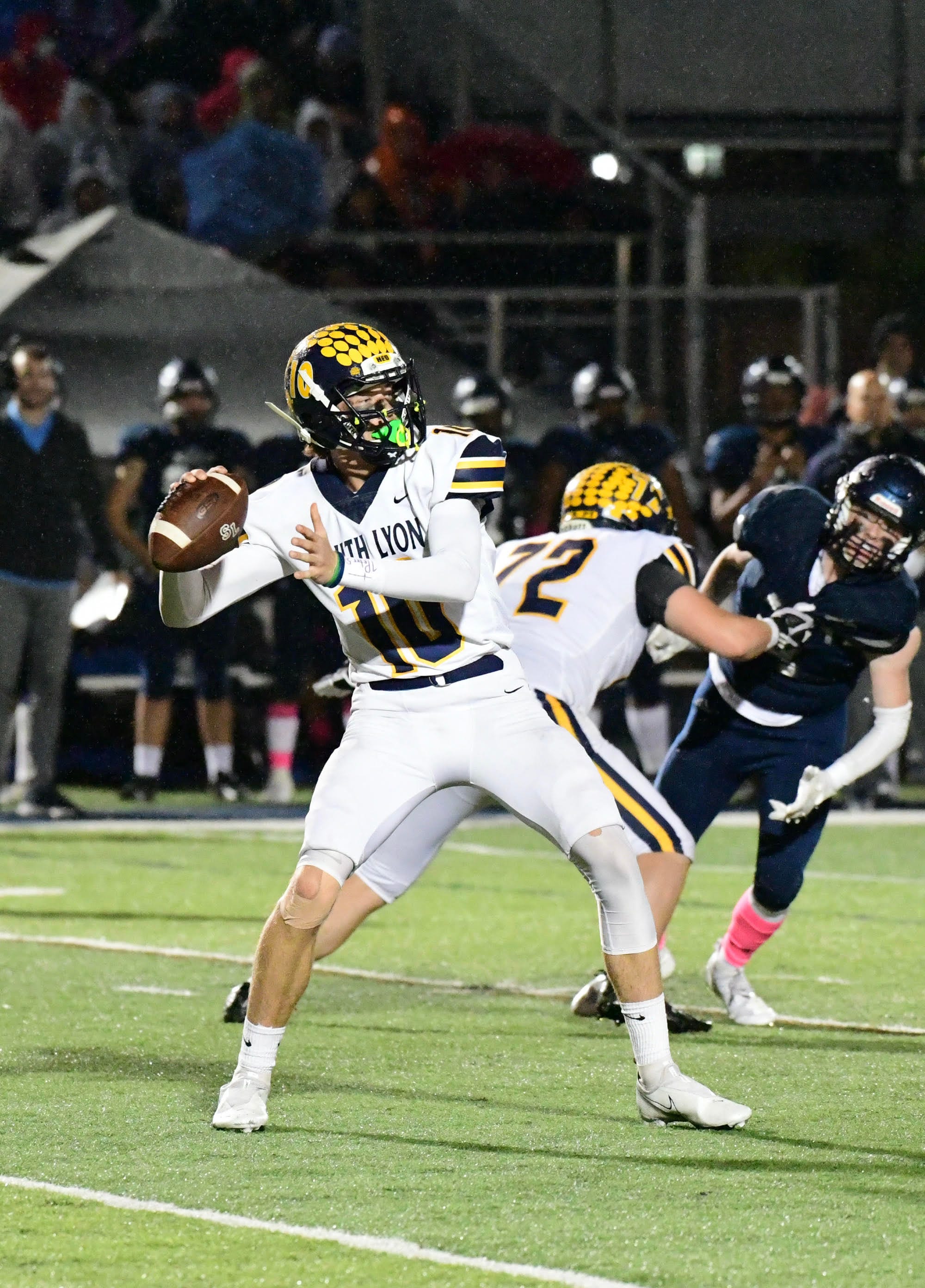 Third-string QB leads South Lyon football to share of LVC title