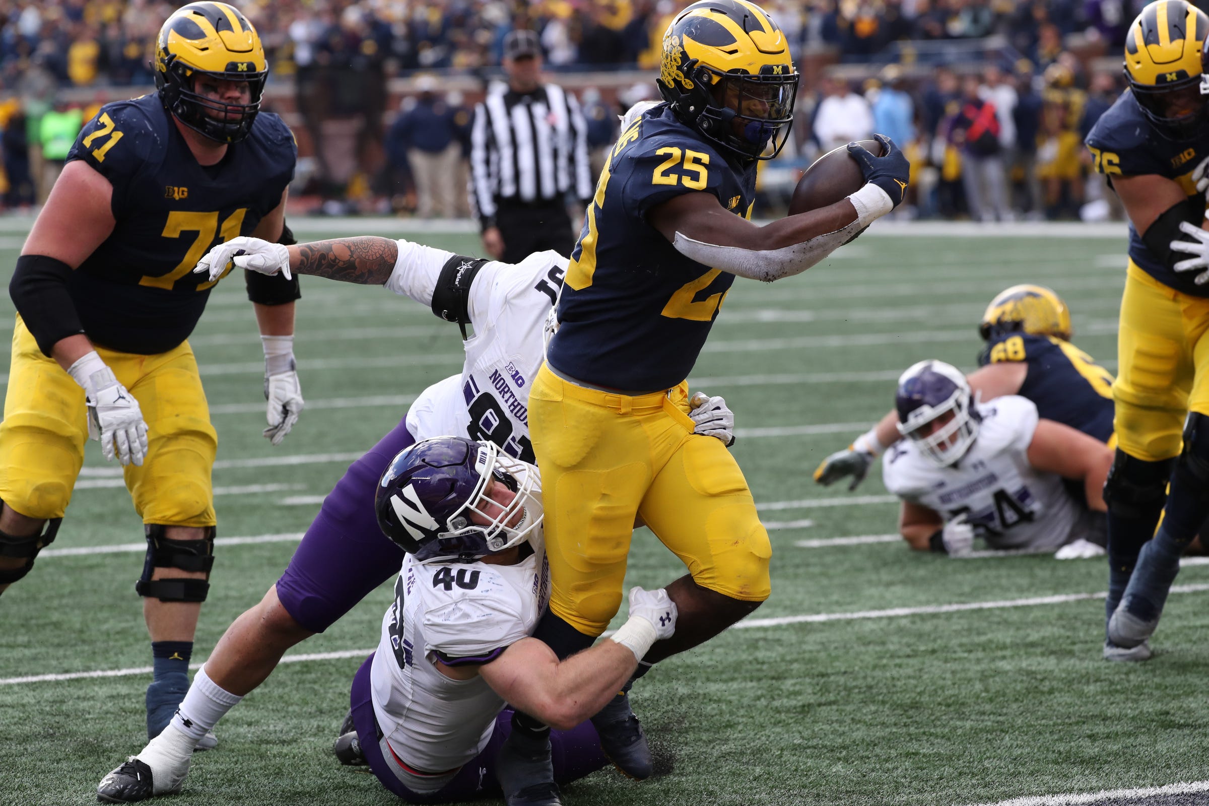 Michigan football rolling behind Hassan Haskins' physicality