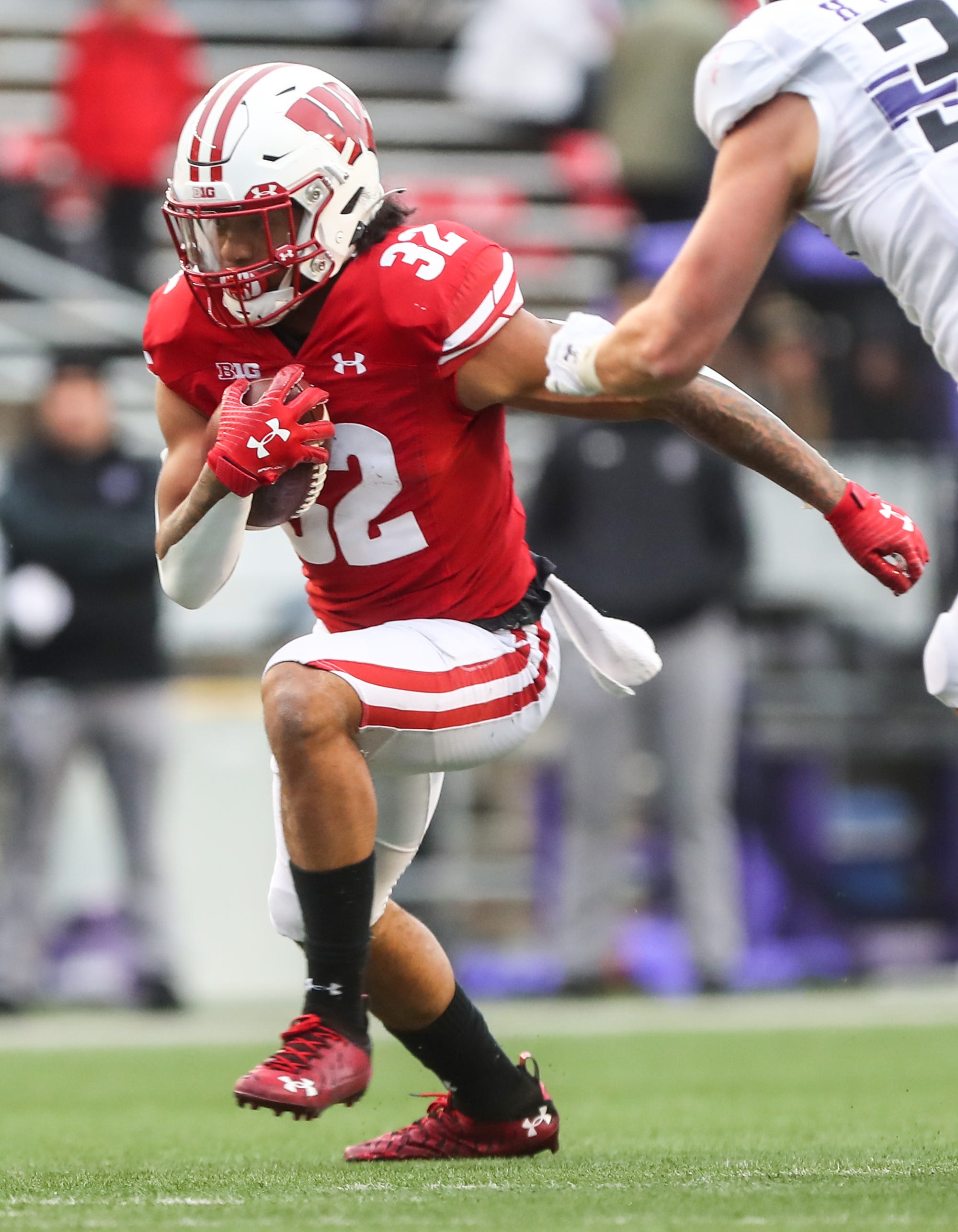 Wisconsin Badgers running back Julius Davis overcame fumble