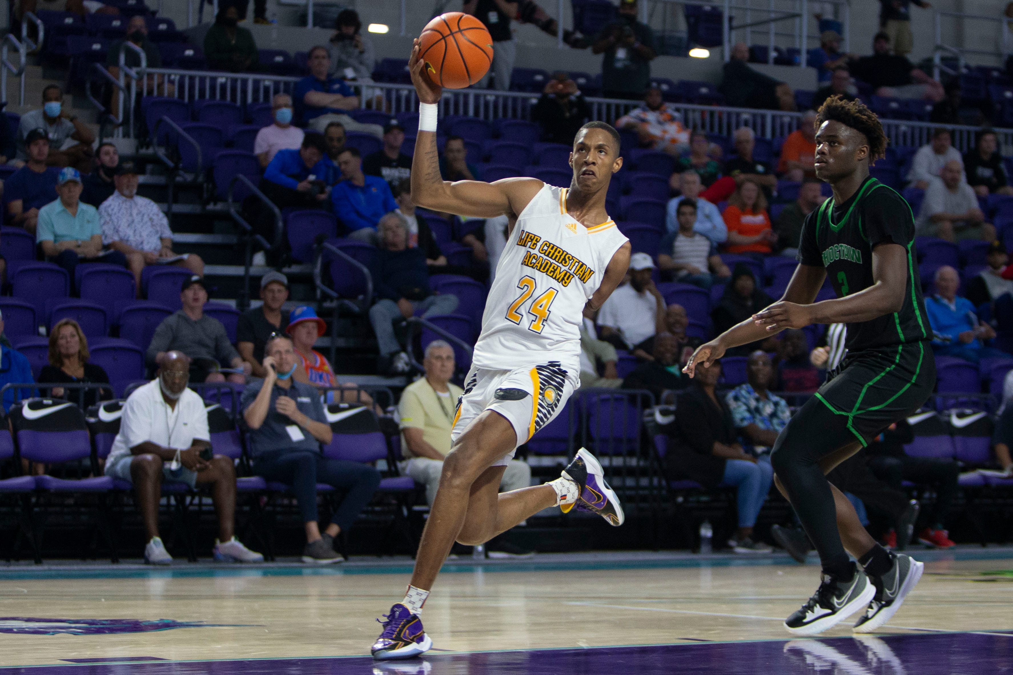 One-armed prep star Hansel Enmanuel's legend grows as he dunks on foes