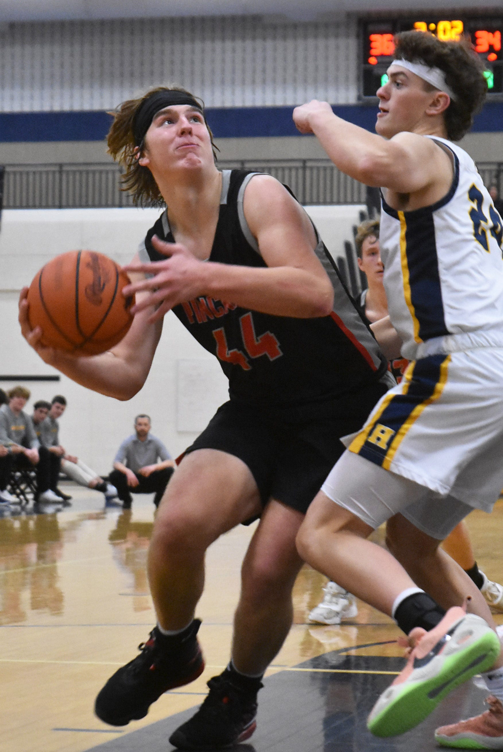 After puking at halftime, Lovell leads Pinckney to OT win at Hartland