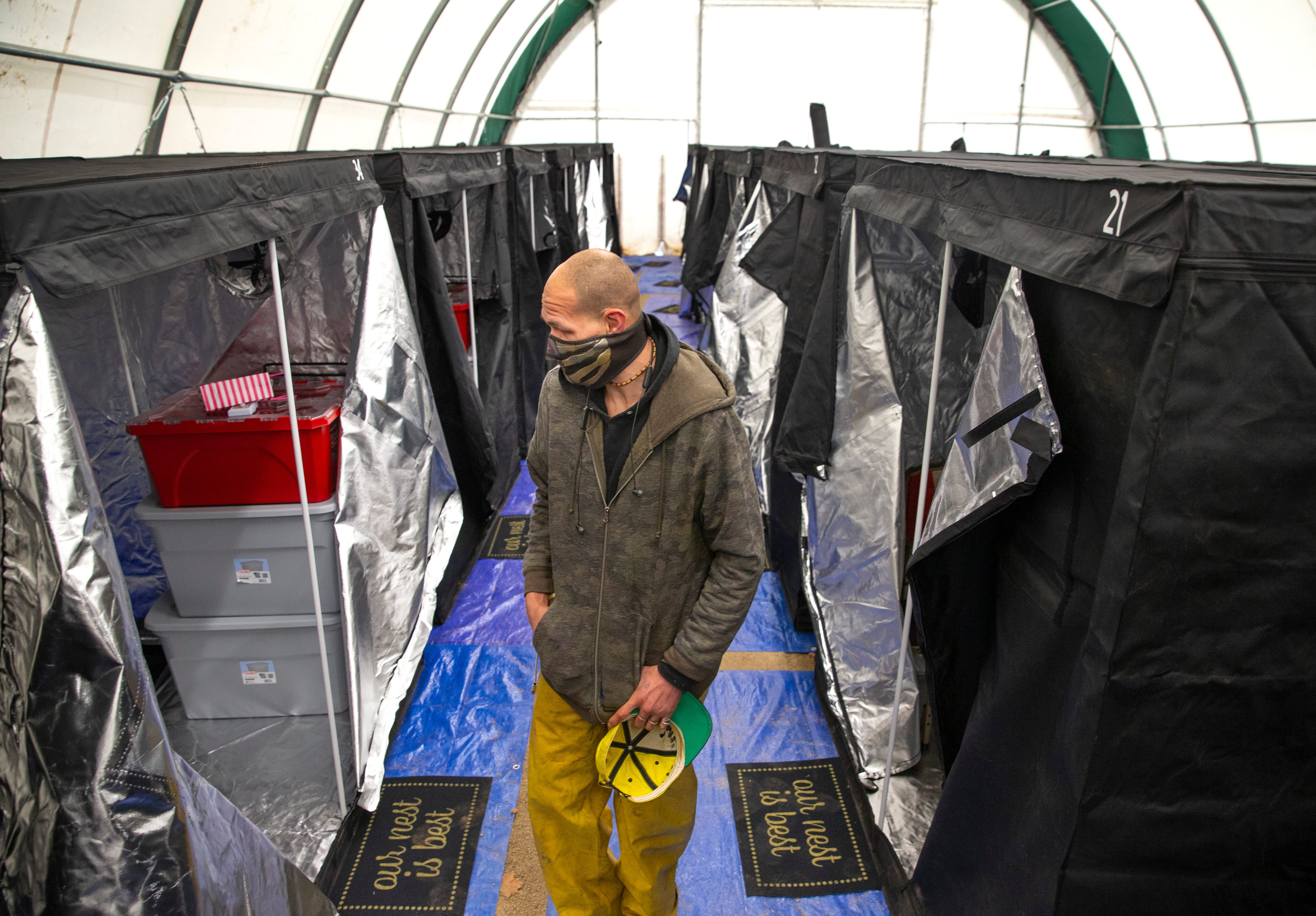 Eugene allows camping for homeless in policy, not practice