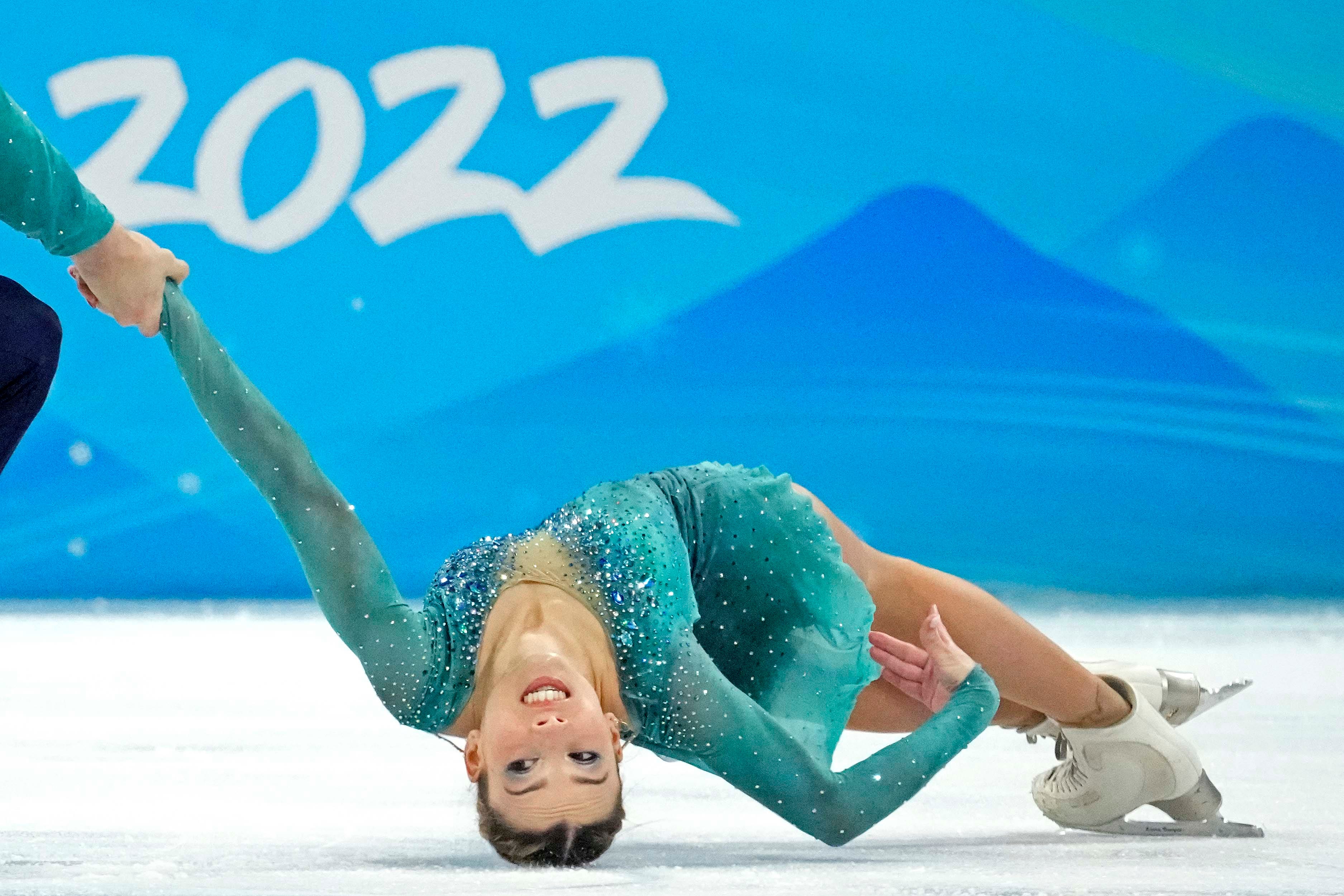 Knox College librarian Yowler puts on ice skates