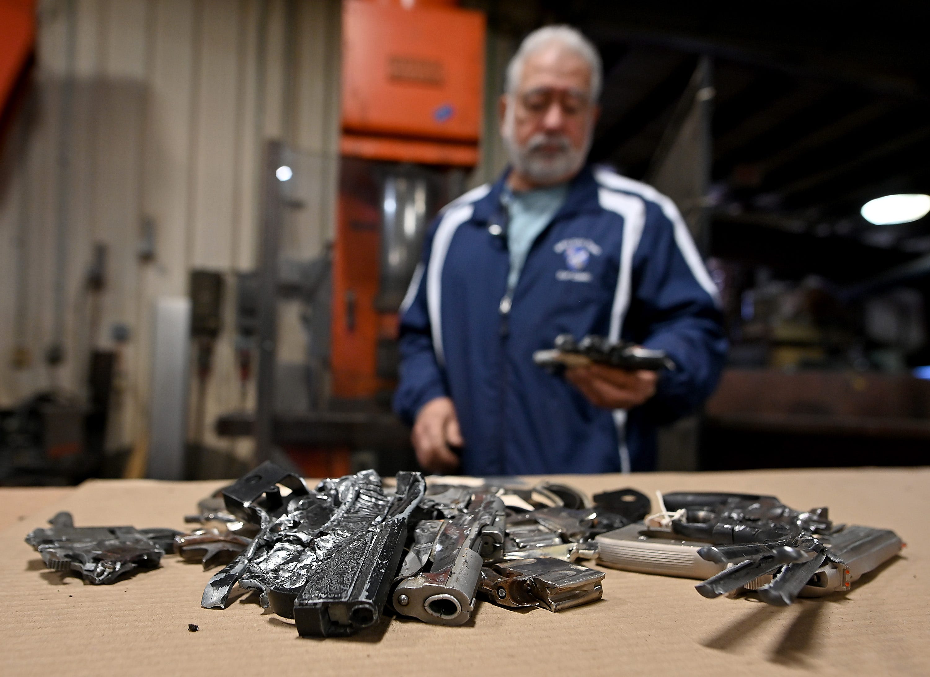 Collected guns in Worcester buyback program crushed at metals shop