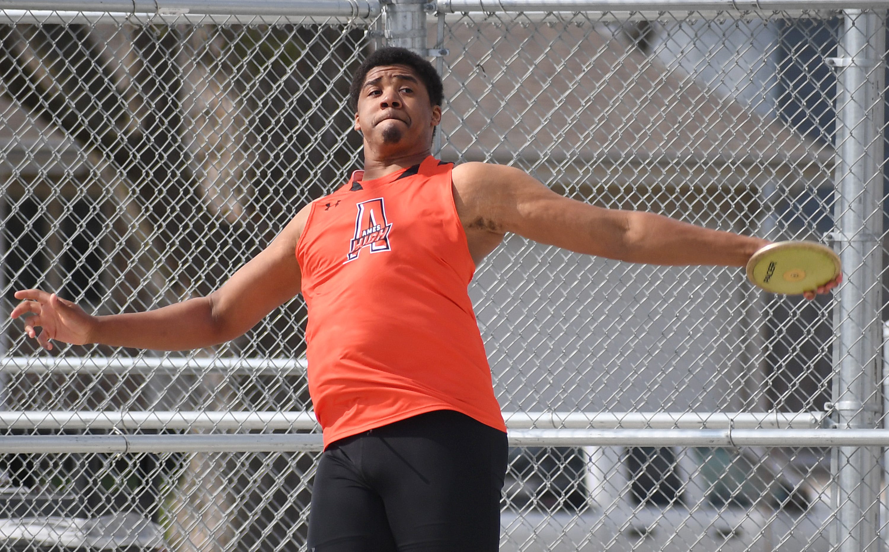 Ames football, basketball star Corey Phillips skilled in discus, too