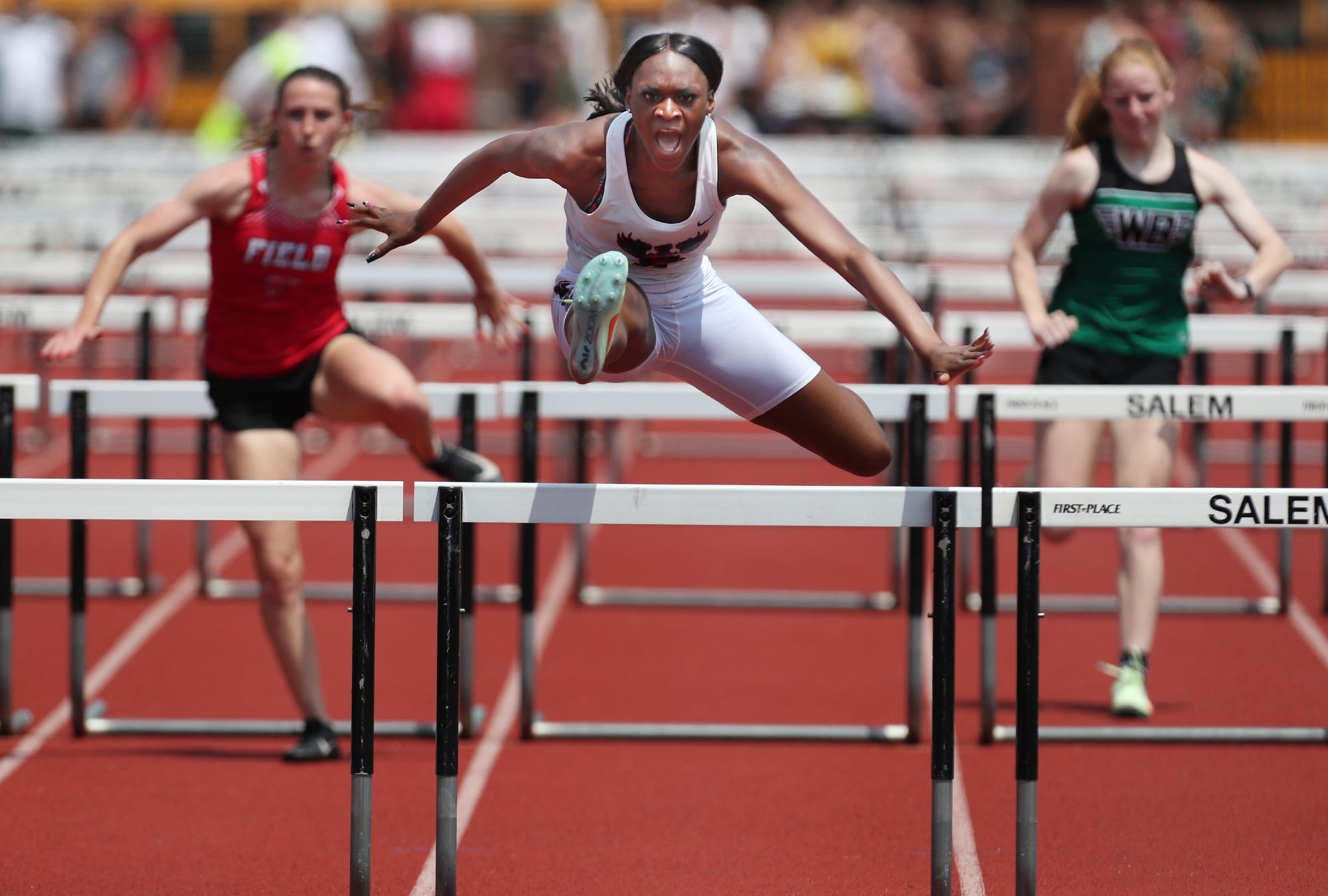 Barker, McCray win four district titles; Buchtel, STVM track strong