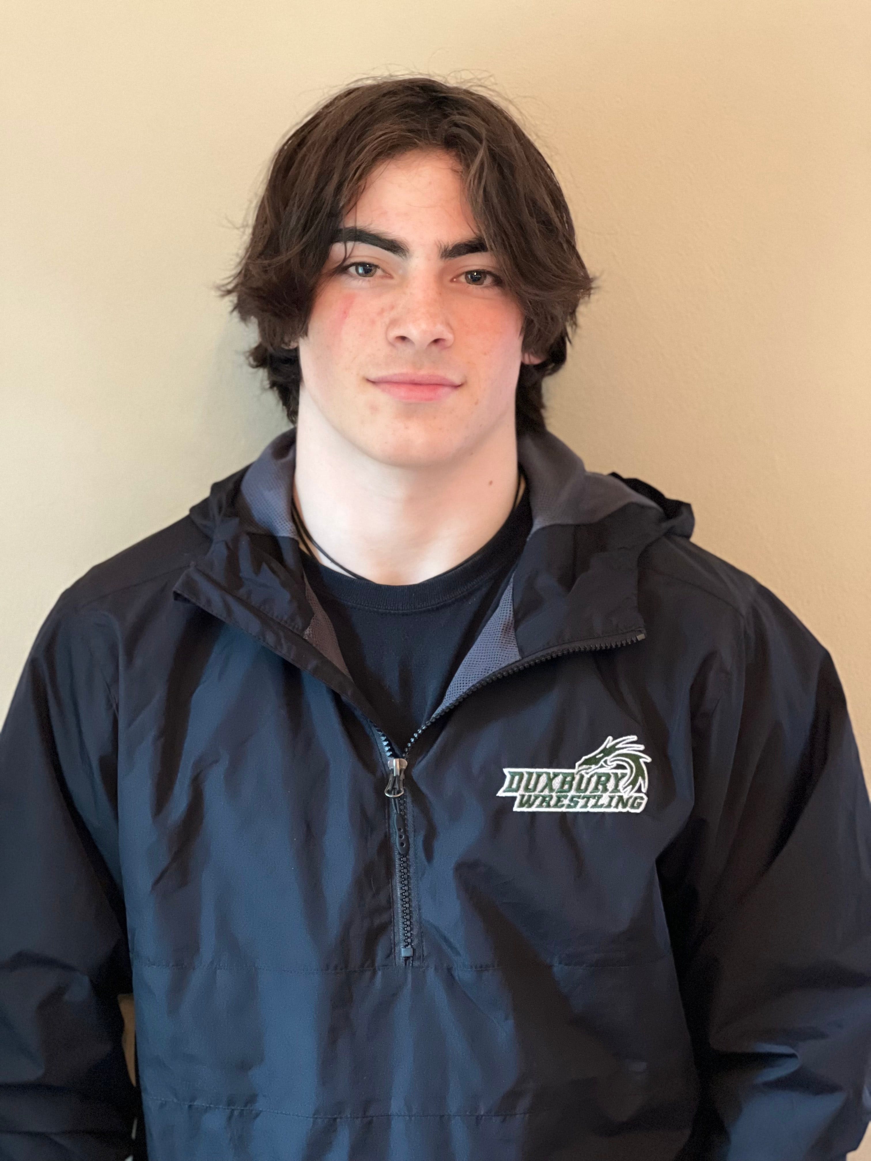 Duxbury High wrestling team defeats Hingam for first time since 2009