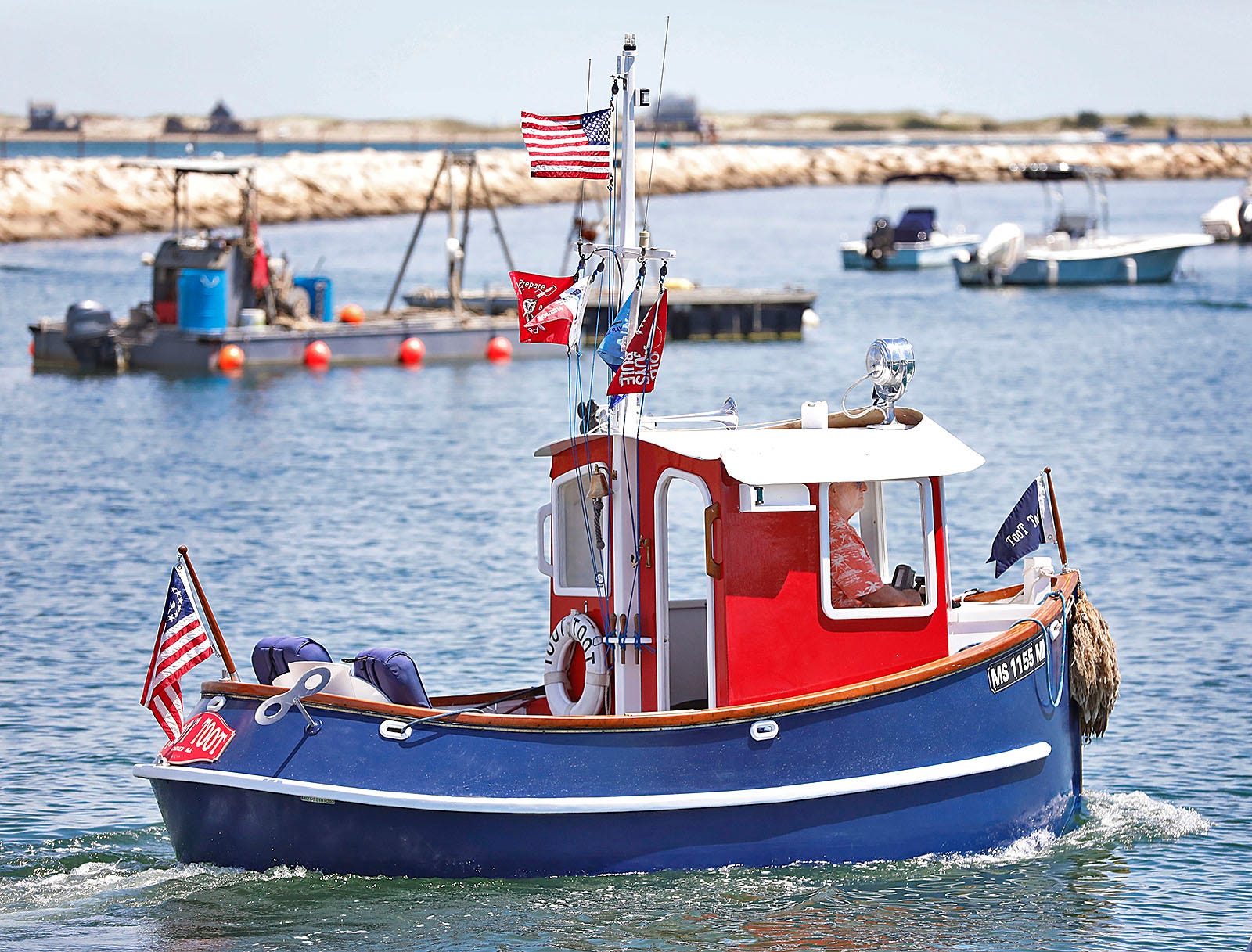 Hand-built tug boat Toot Toot is a staple of Plymouth Harbor
