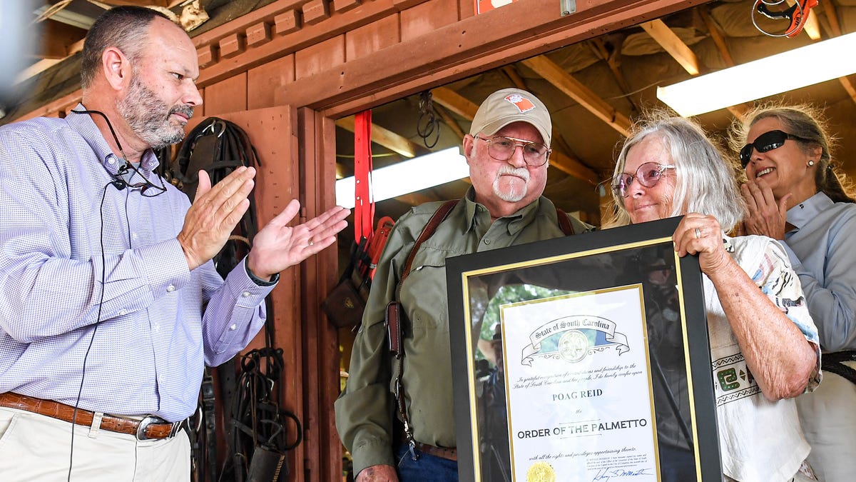 Order of the Palmetto given to T Ed Garrison Arena founder Dr Poag Reid