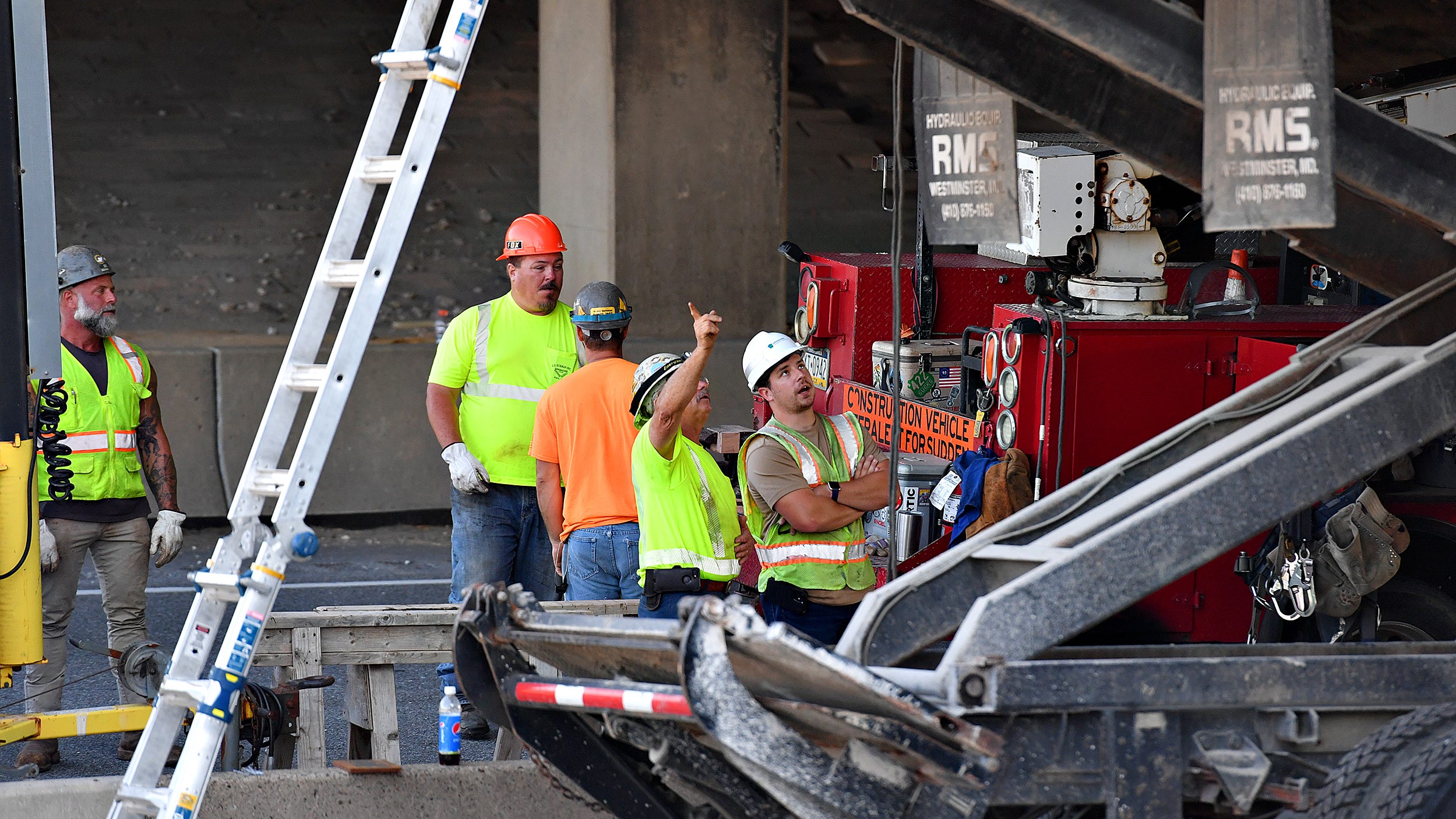 Dump Truck Driver Cited After Striking Queen Street Bridge In August
