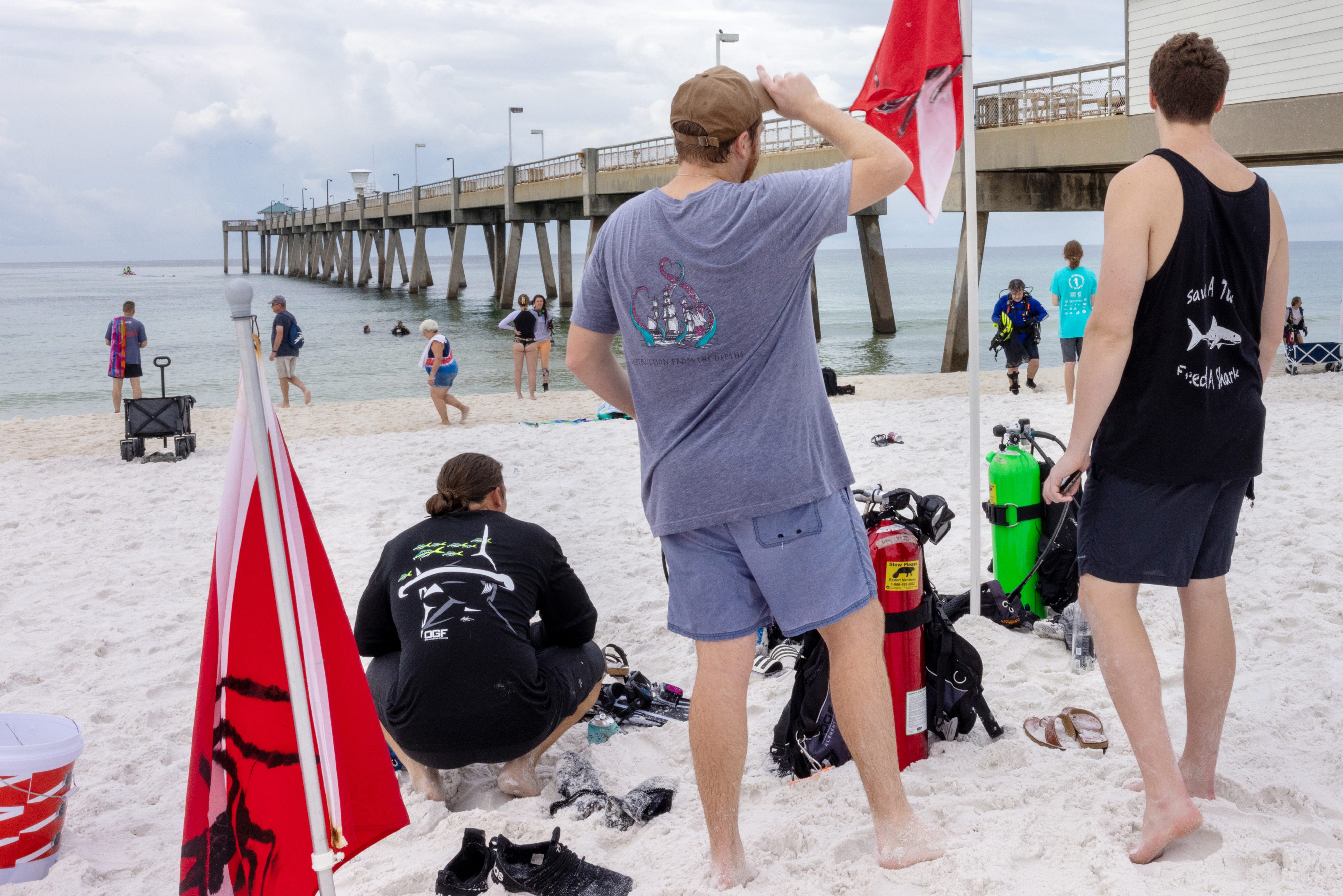 Okaloosa Island Pier: Scuba divers clean up fishing tackle, trash