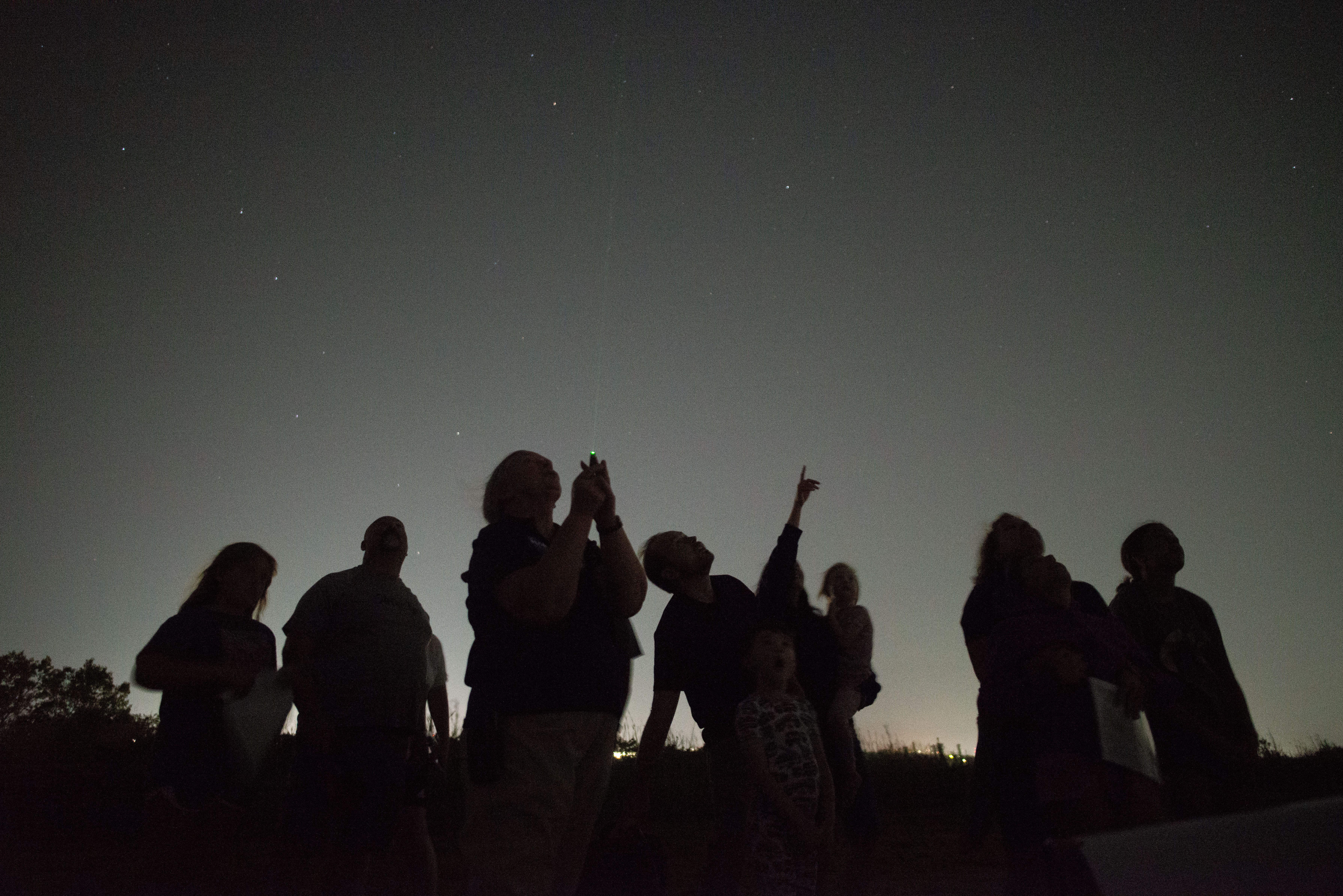 Topeka residents learn how to view the night sky during viewing event