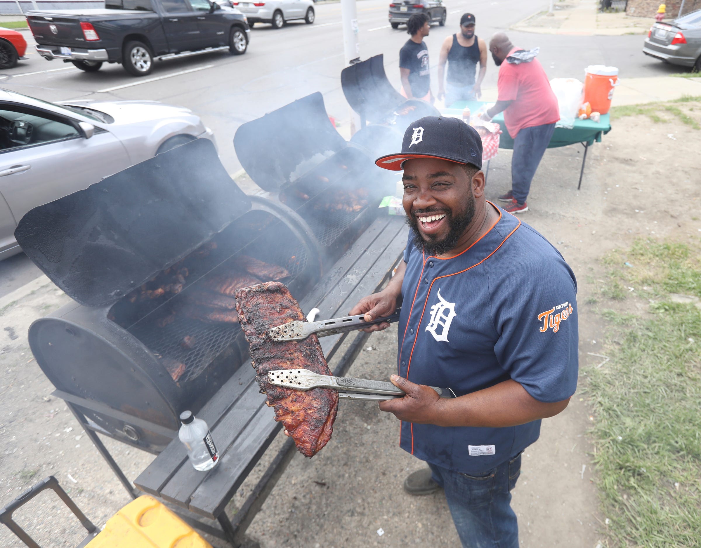 Street barbecue along Detroit's Gratiot Avenue brings cash, redemption