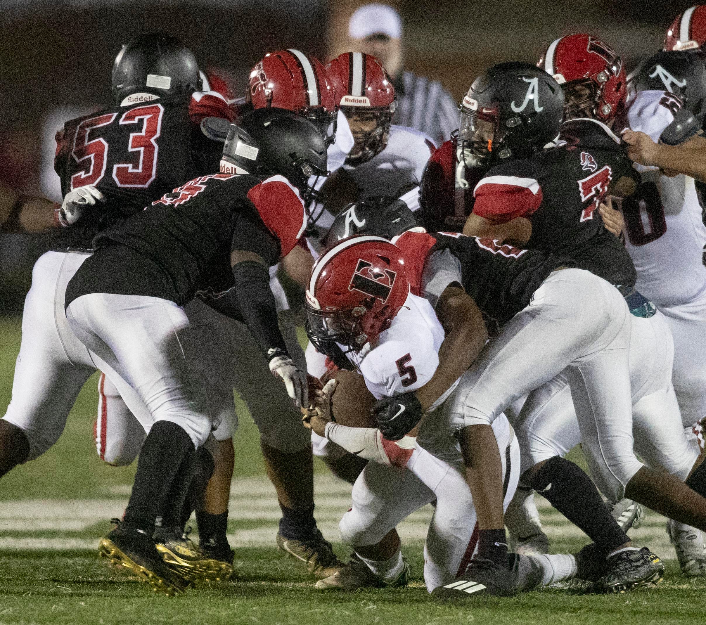 Rockford East runs QB sneak multiple times in win over Auburn