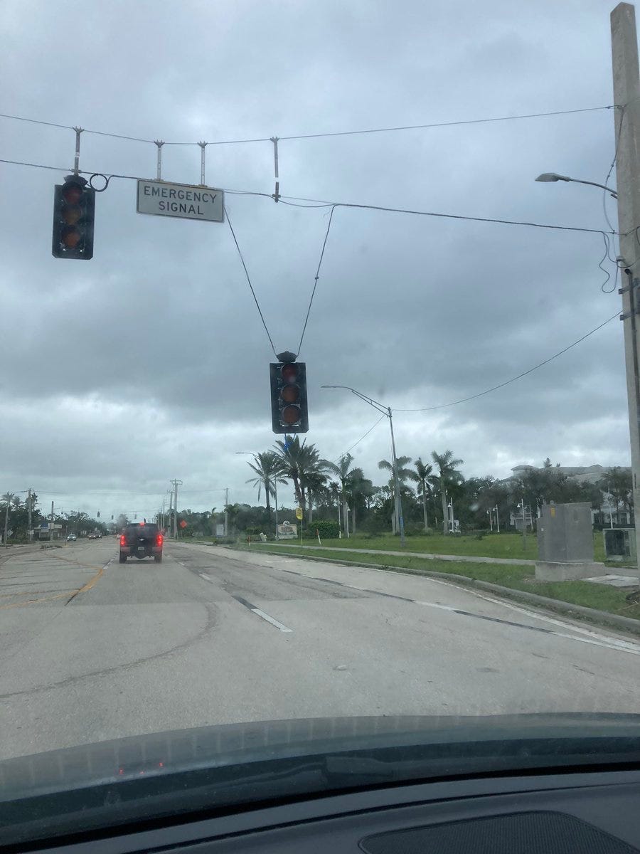 A traffic light pole in Cape Coral was knocked down by Hurricane Ian.